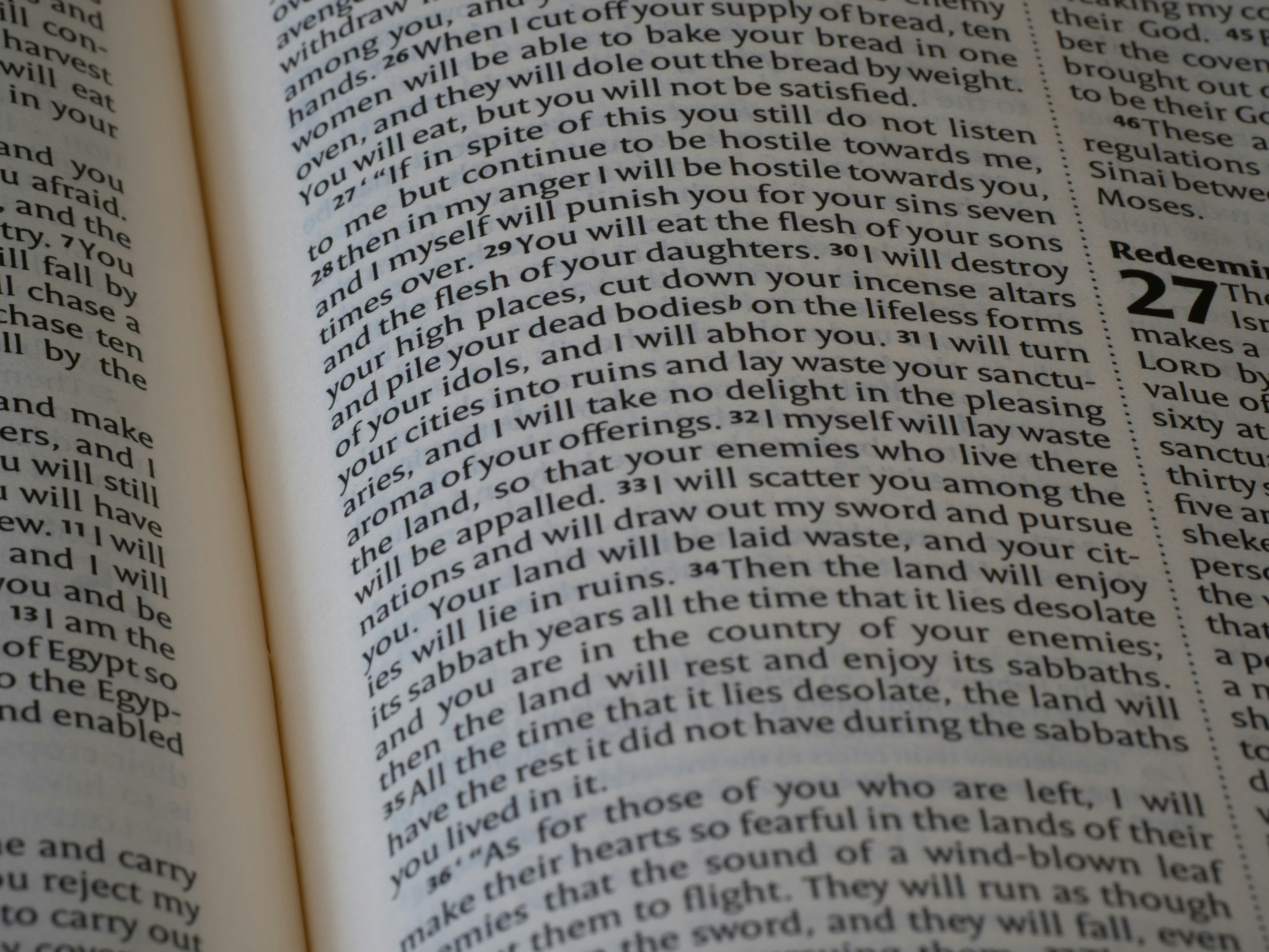 Newspaper Pages in Focus: A Close-Up of Text and Edges