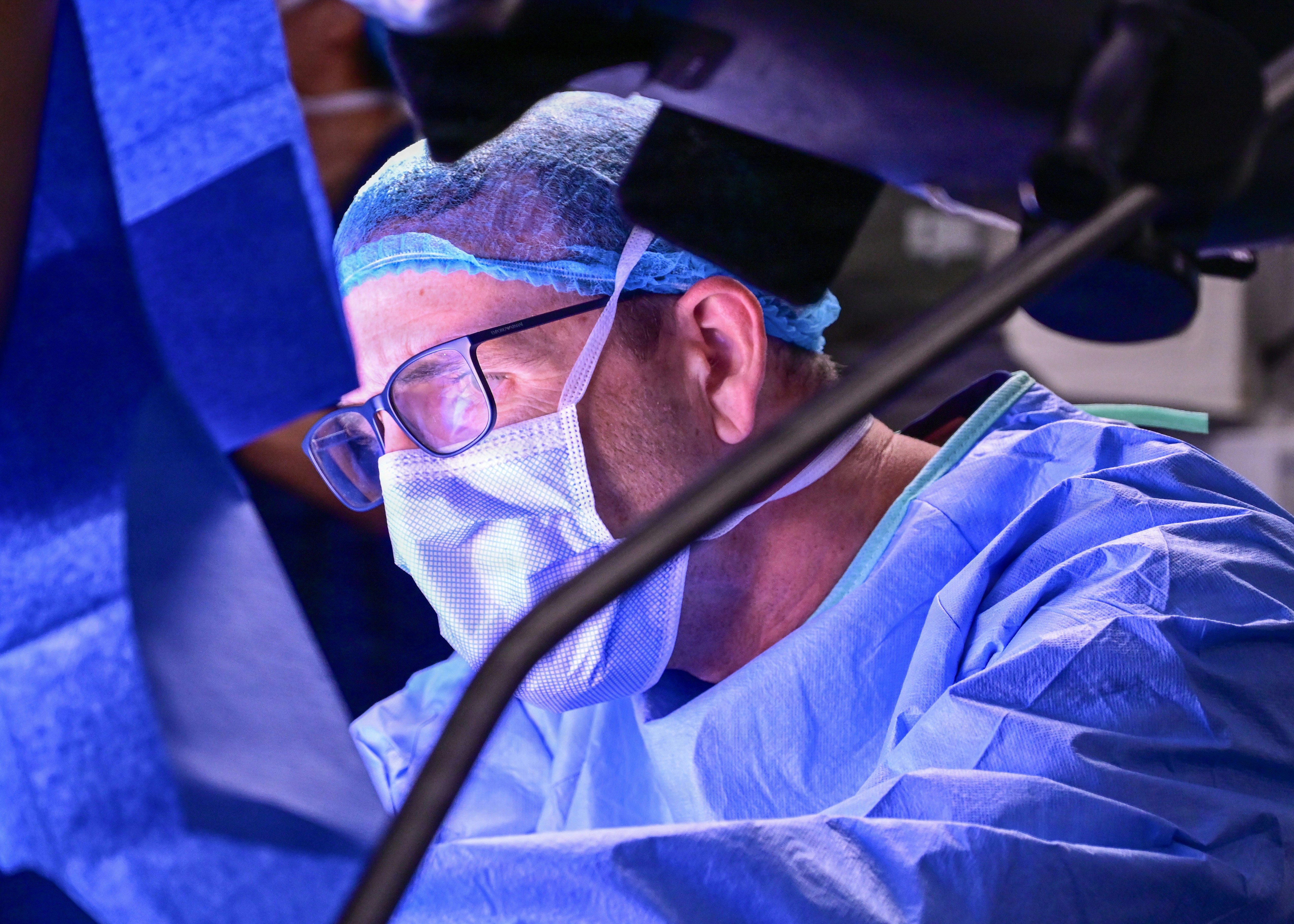 U.S. Navy Lt. Cmdr. James O’Loughlin, assigned to Fleet Surgical Team (FST) 5, performs surgery while underway on Wasp-class Amphibious assault ship USS Essex (LHD 2), June 10, 2026. Essex is underway in the U.S. 3rd Fleet area of operations. An integral part of the U.S. Pacific Fleet, U.S. 3rd Fleet leads naval forces in the Indo-Pacific and provides the realistic, relevant training necessary to execute the U.S. Navy's role across the full spectrum of military operations. U.S. 3rd Fleet works together with allies and partners to advance freedom of navigation and overflight, the rule of law and other principles that underpin security for the Indo-Pacific region. (U.S. Navy photo by Mass Communication Specialist Seaman Ivan A. Garcia)