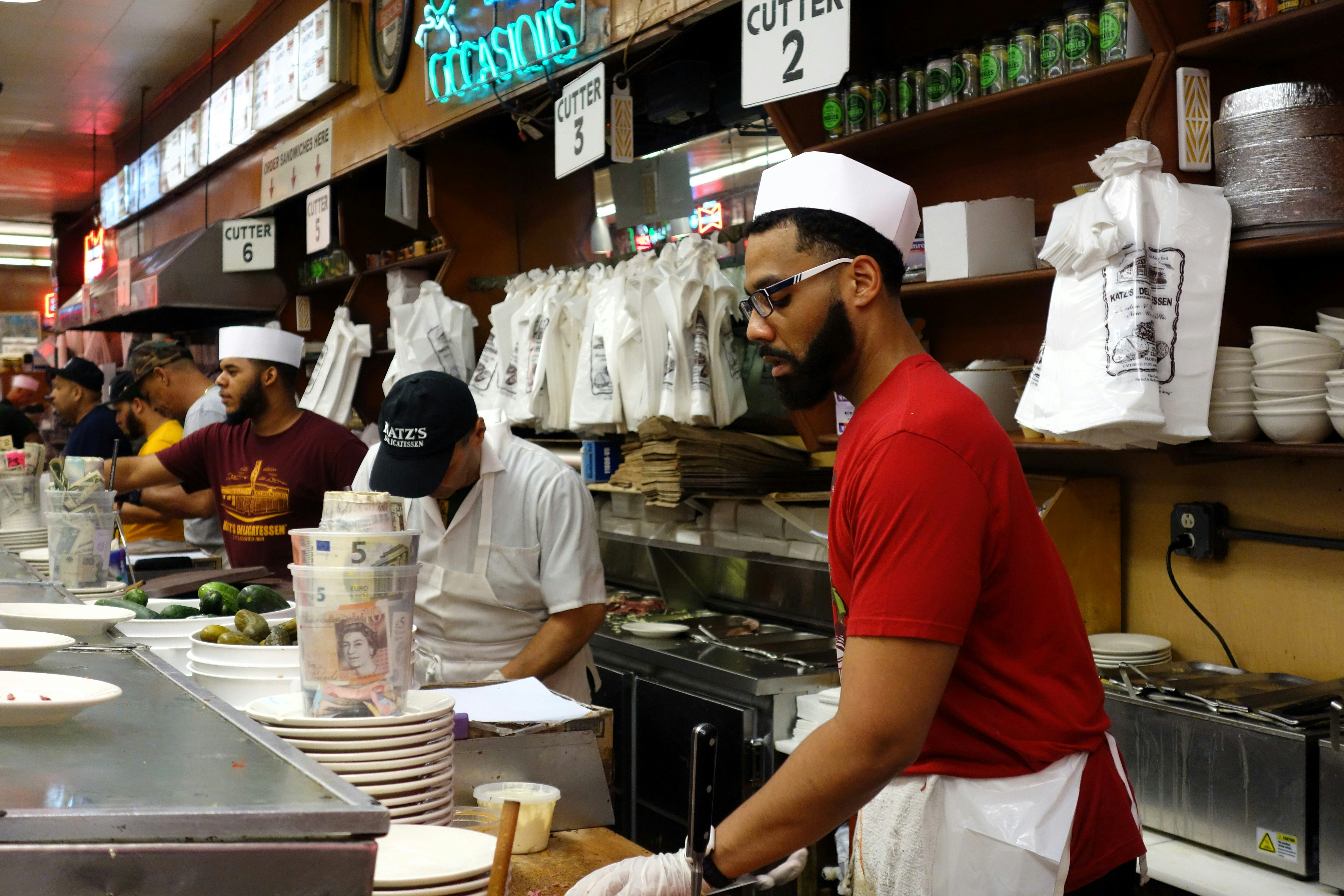 Slicing hands, sizzling plates: a bustling halal counter