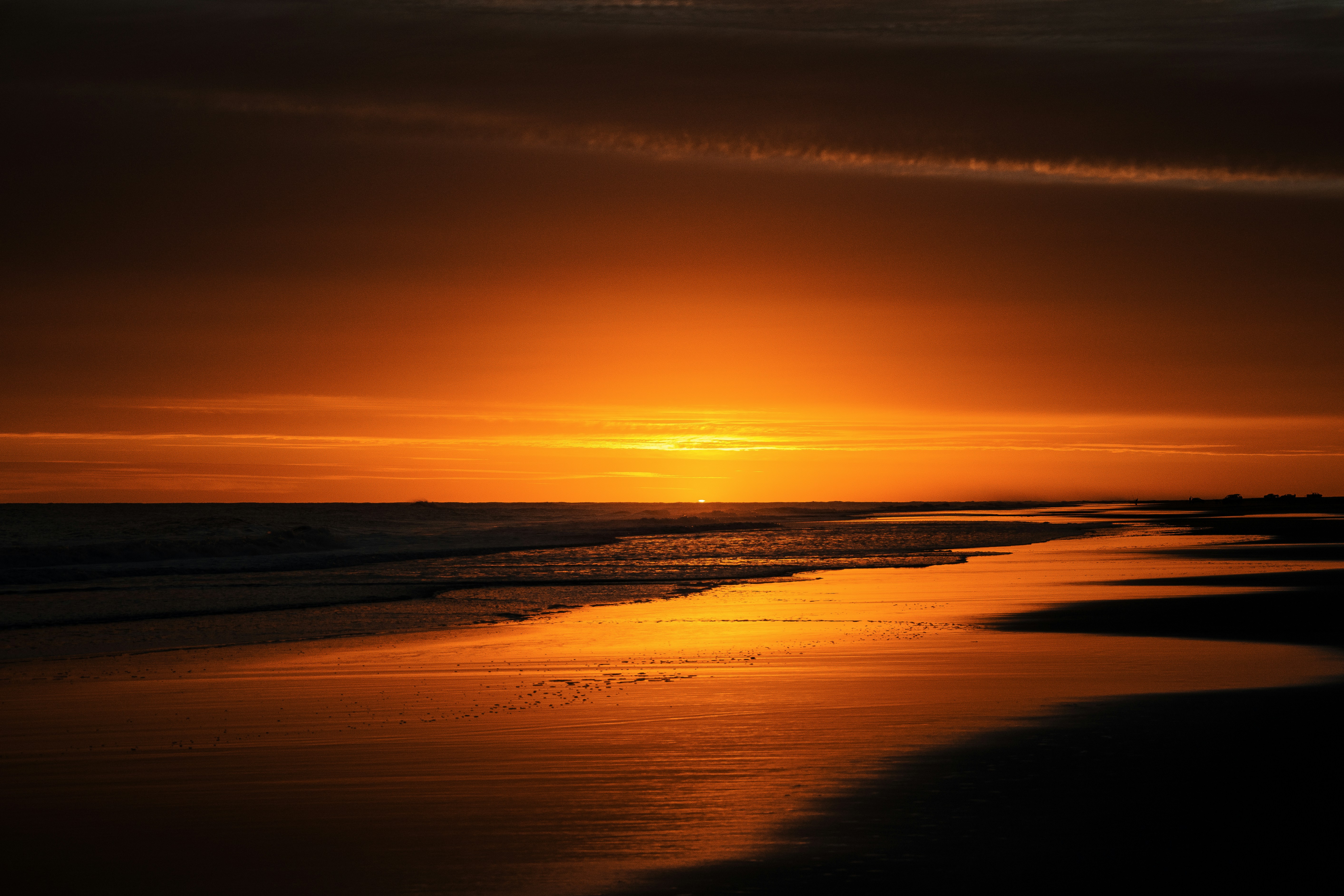 Embers on the Tide: A Quiet Horizon at Dusk