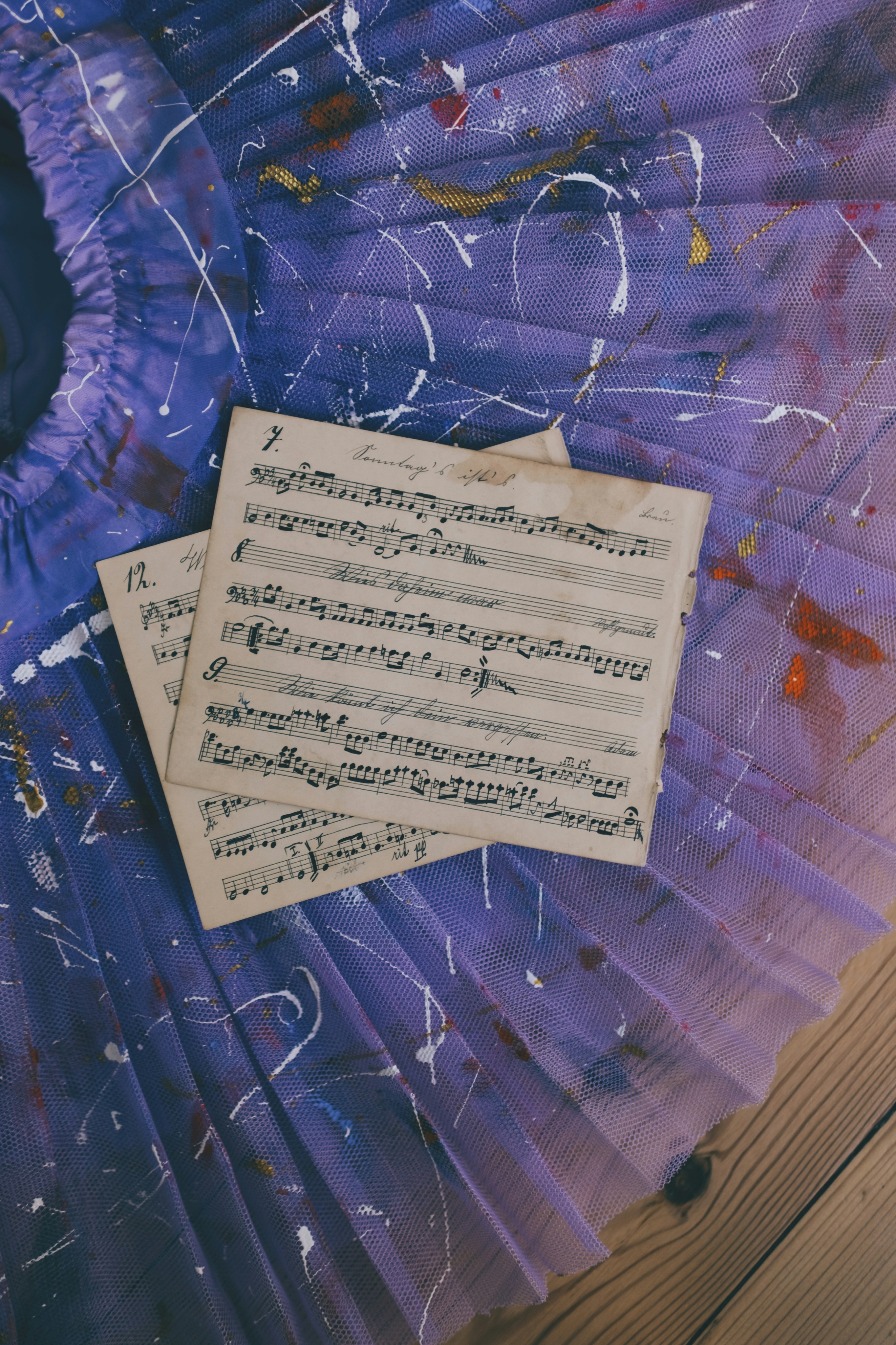 Sheet Music on a Painted Canvas: Quiet Moment of Music and Art