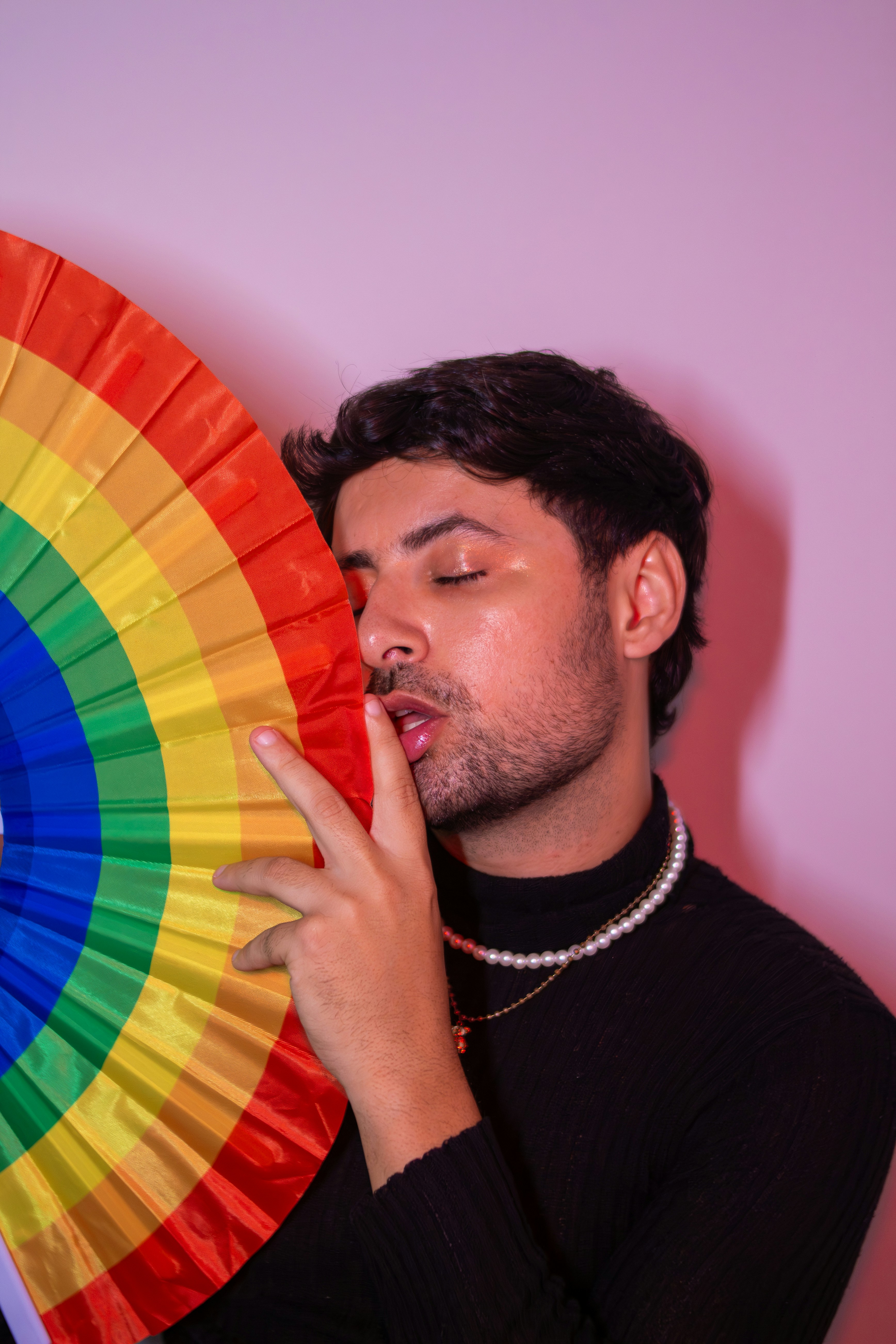 Whispered Kiss of Color: Portrait with Rainbow Fan