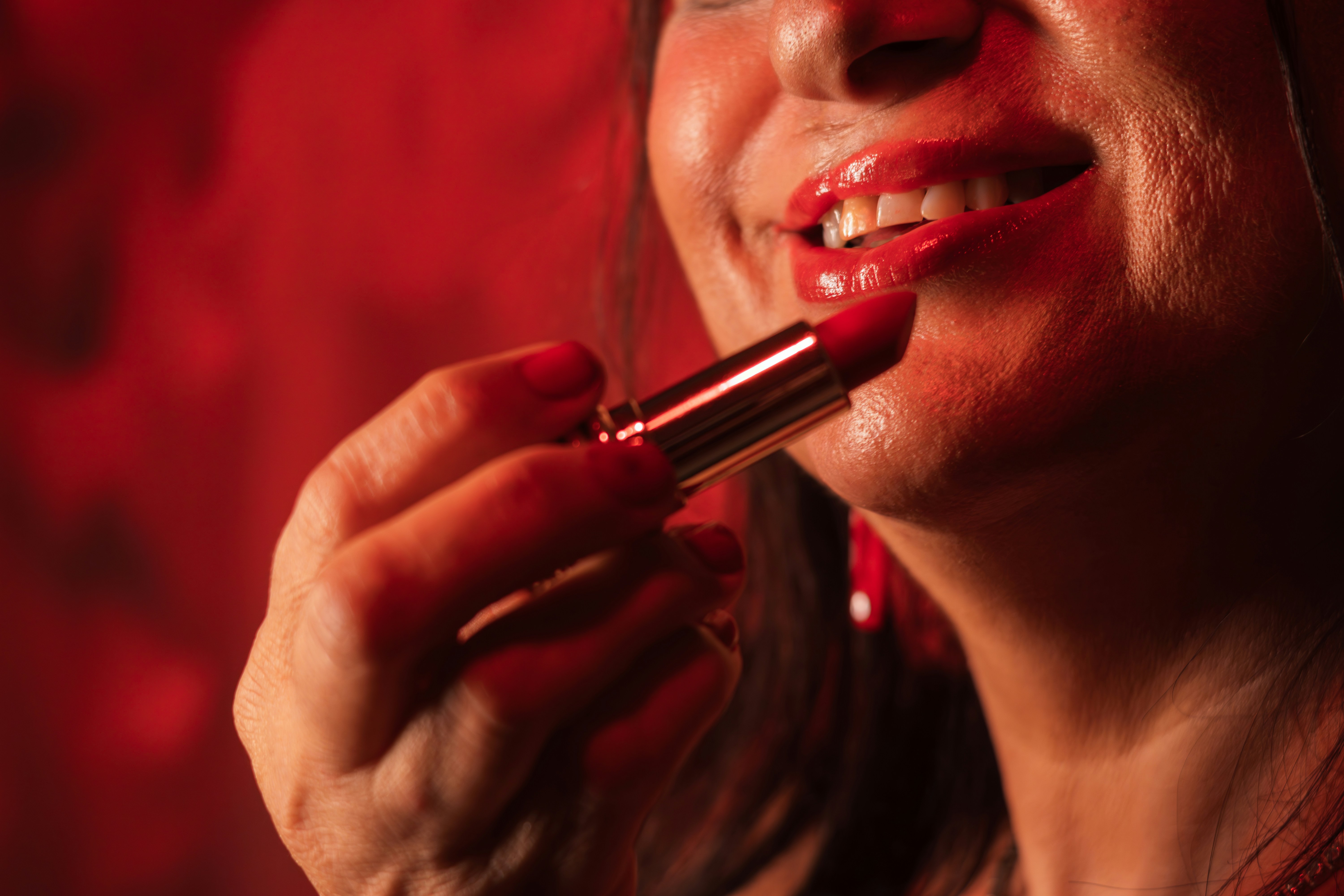 Lipstick in Focus: A Close-Up of a Red-Carved Smile