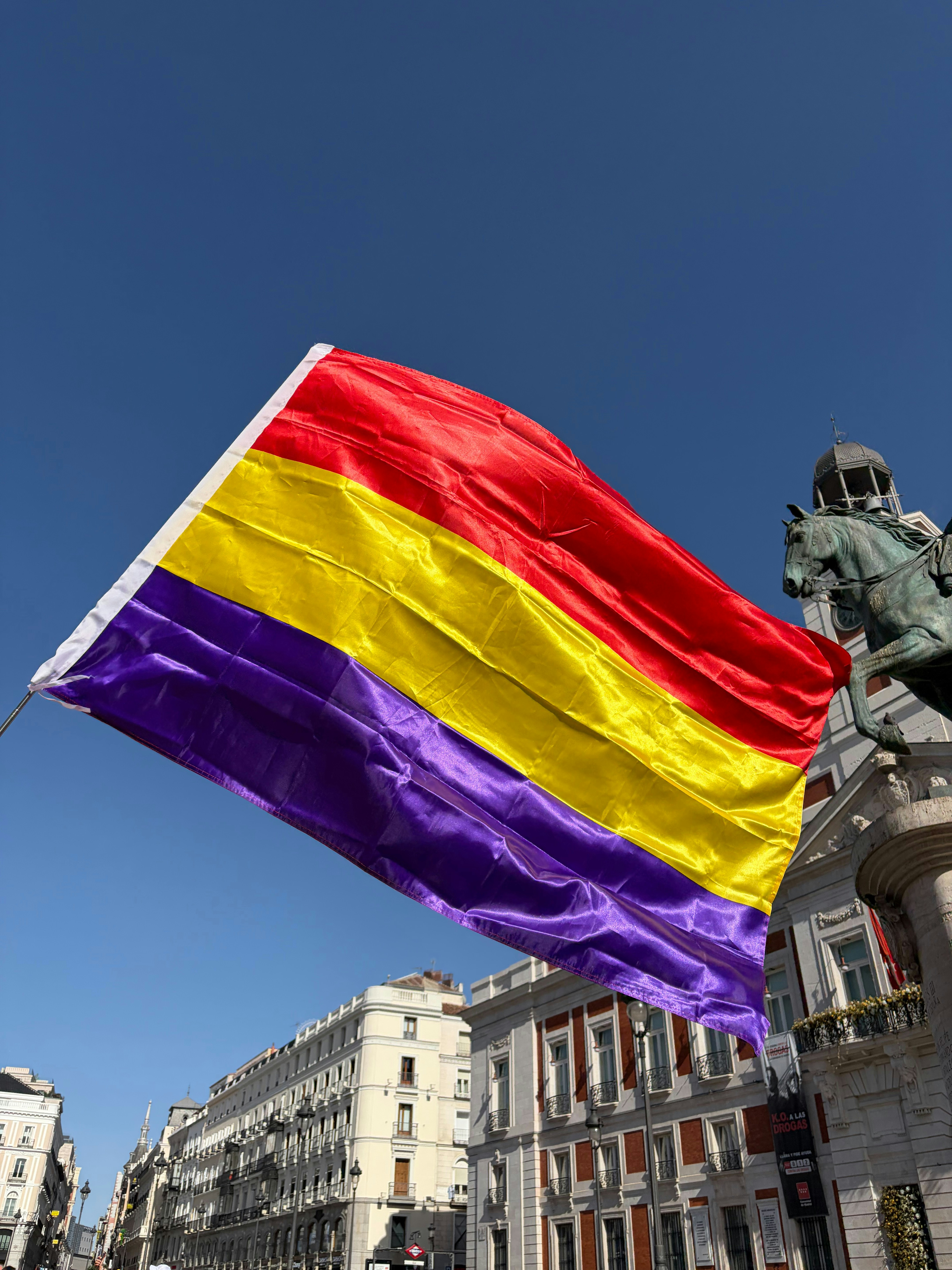 Flag of Pride Lithographs Across a City Sky