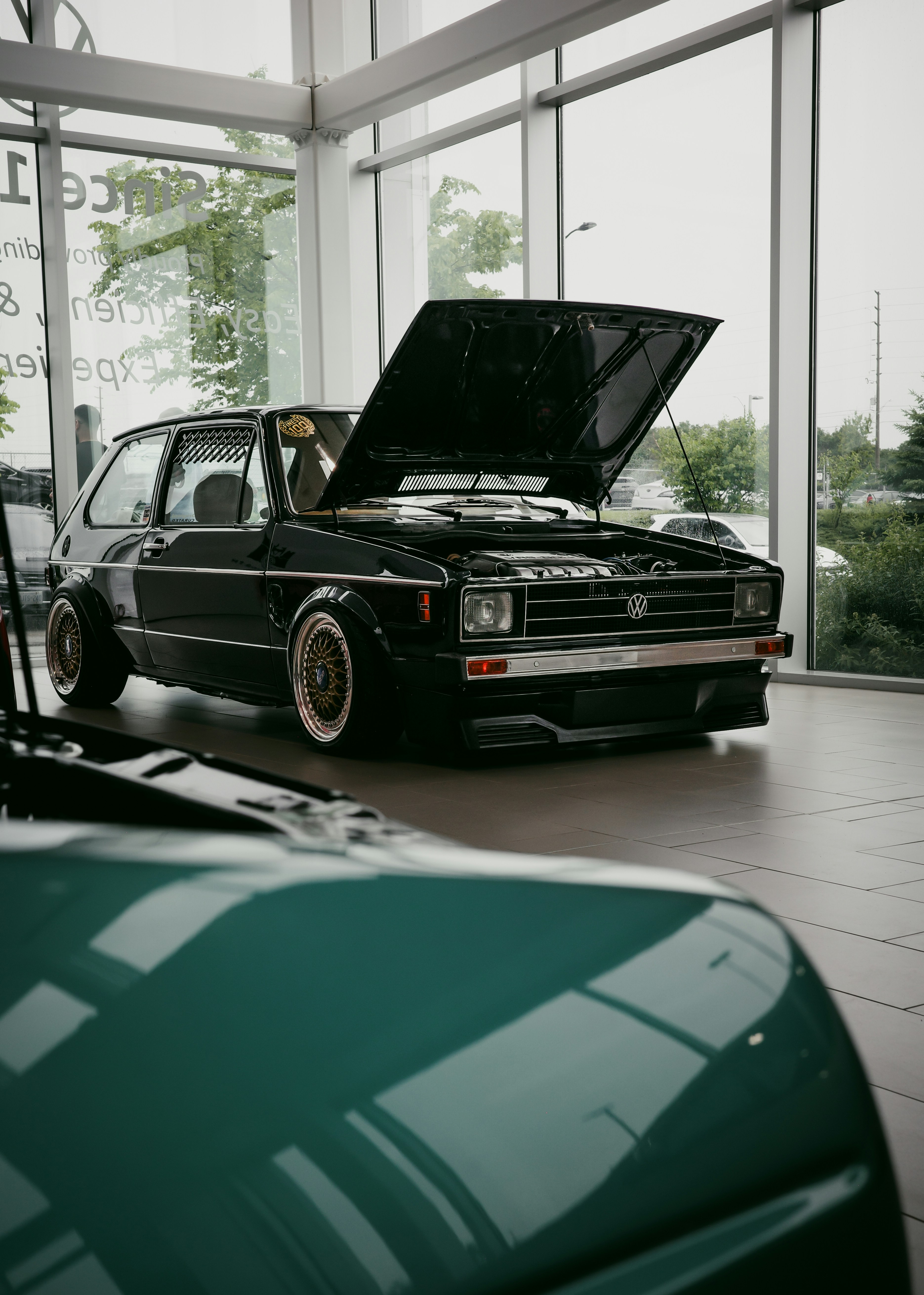 Under the Hinge: A Classic VW Gears Up in Silent Studio Light