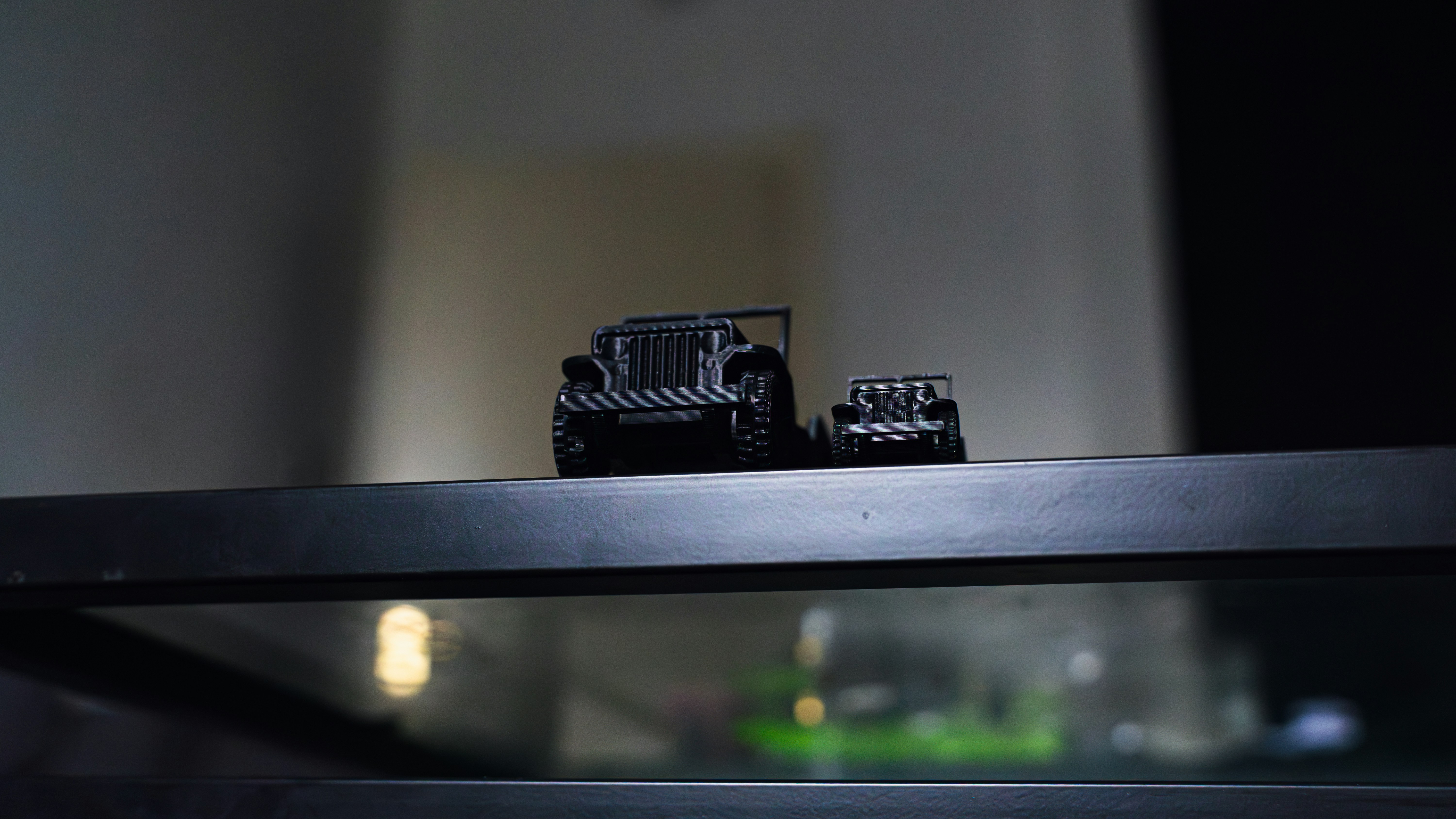 Miniature Tanks on a Shelf: Quiet Corridor with a Hidden Scene