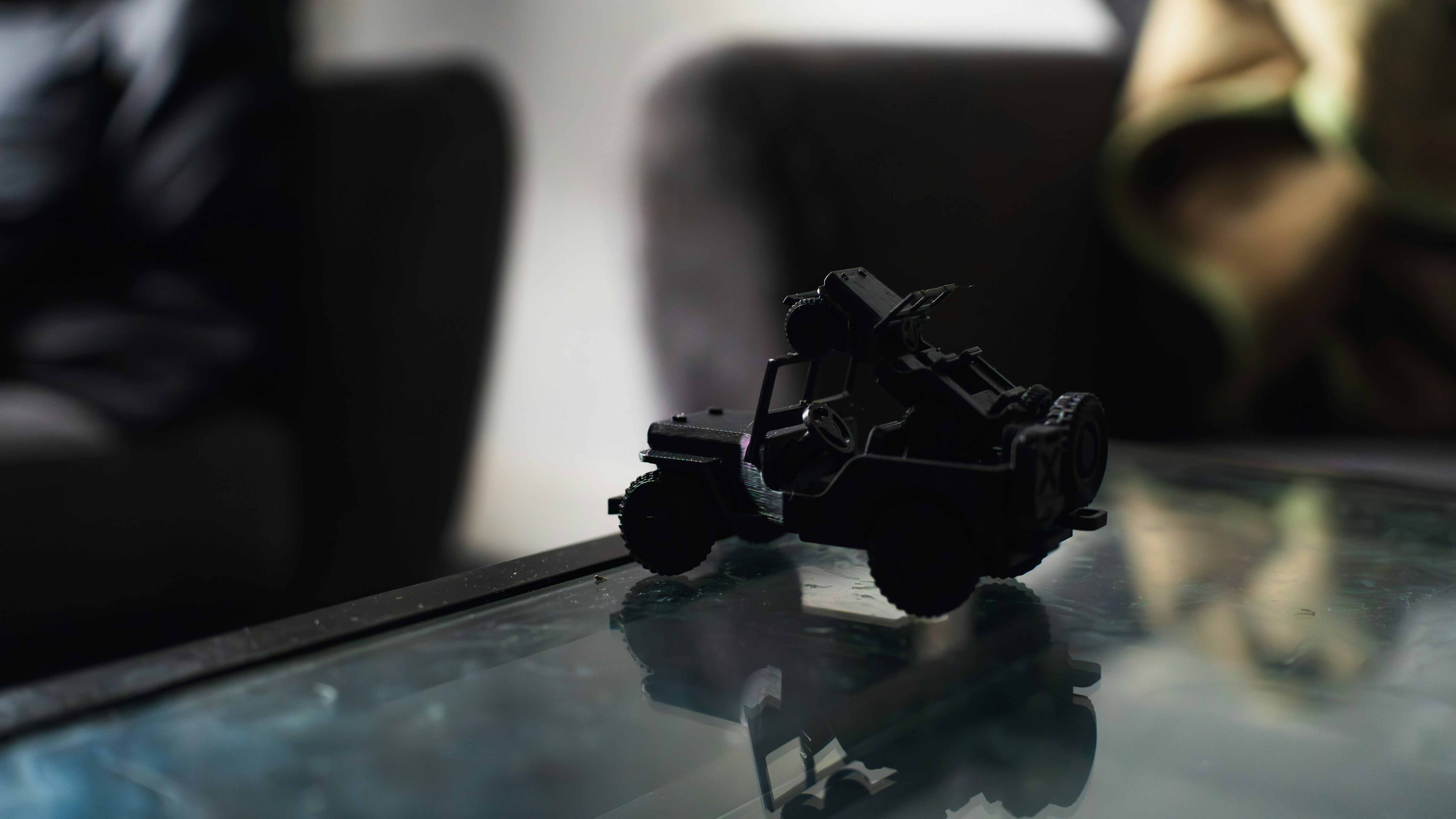 Tiny Vehicle, Big Scene: A Miniature on a Glass Surface