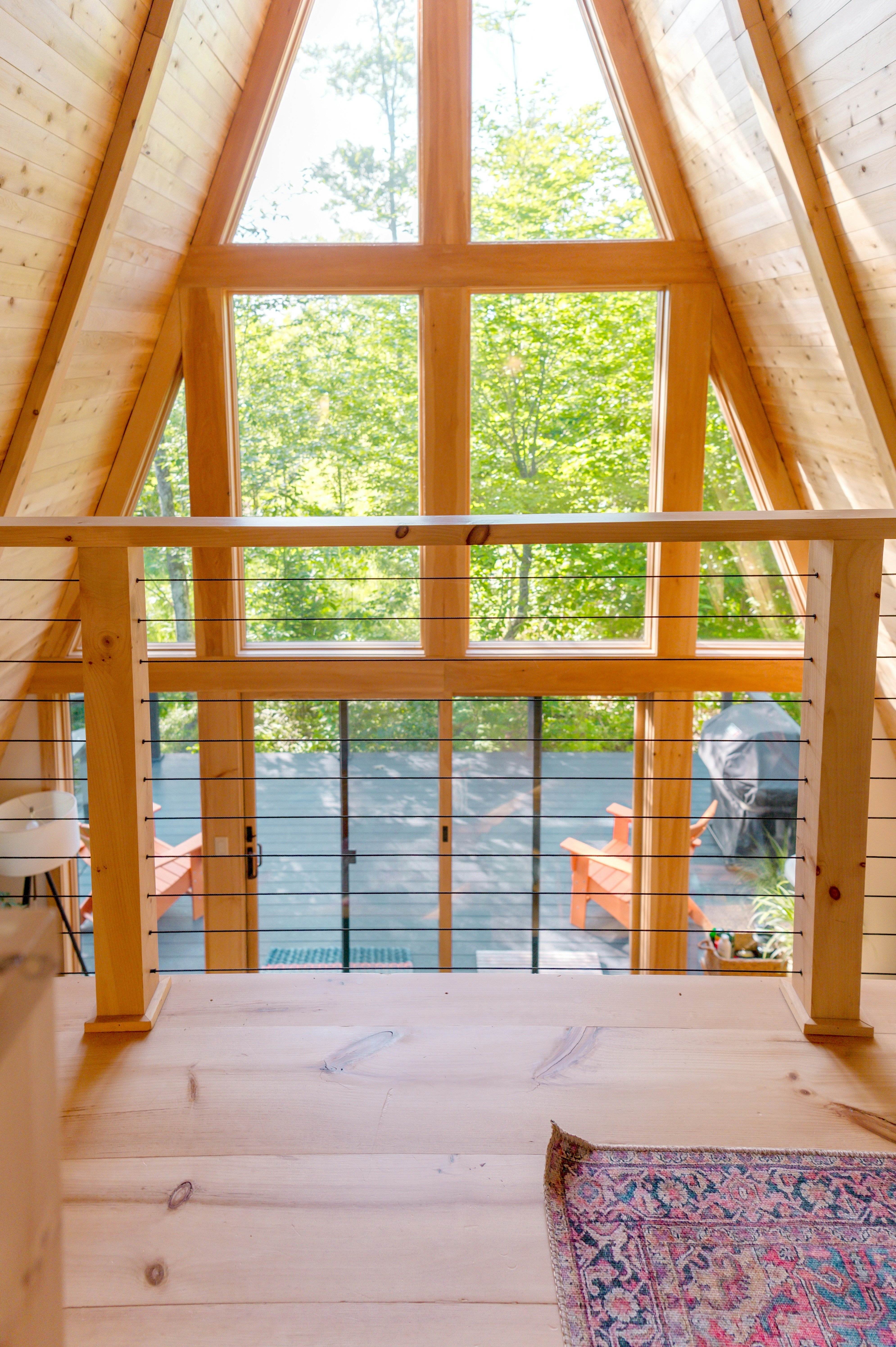 Sunlit A-frame Loft with Floor-to-Ceiling Windows