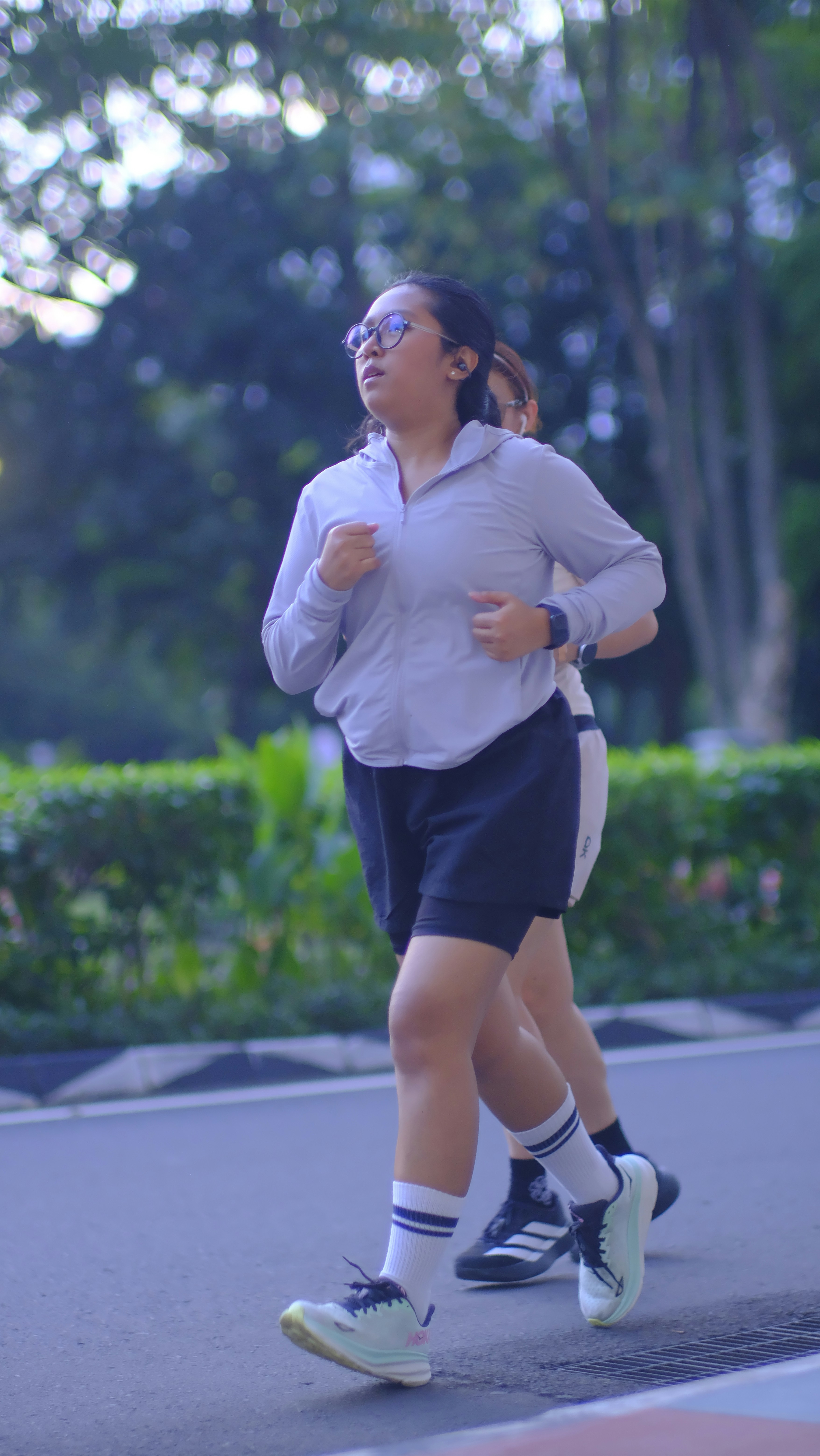Midstride Momentum: A Runner in Quiet Focus