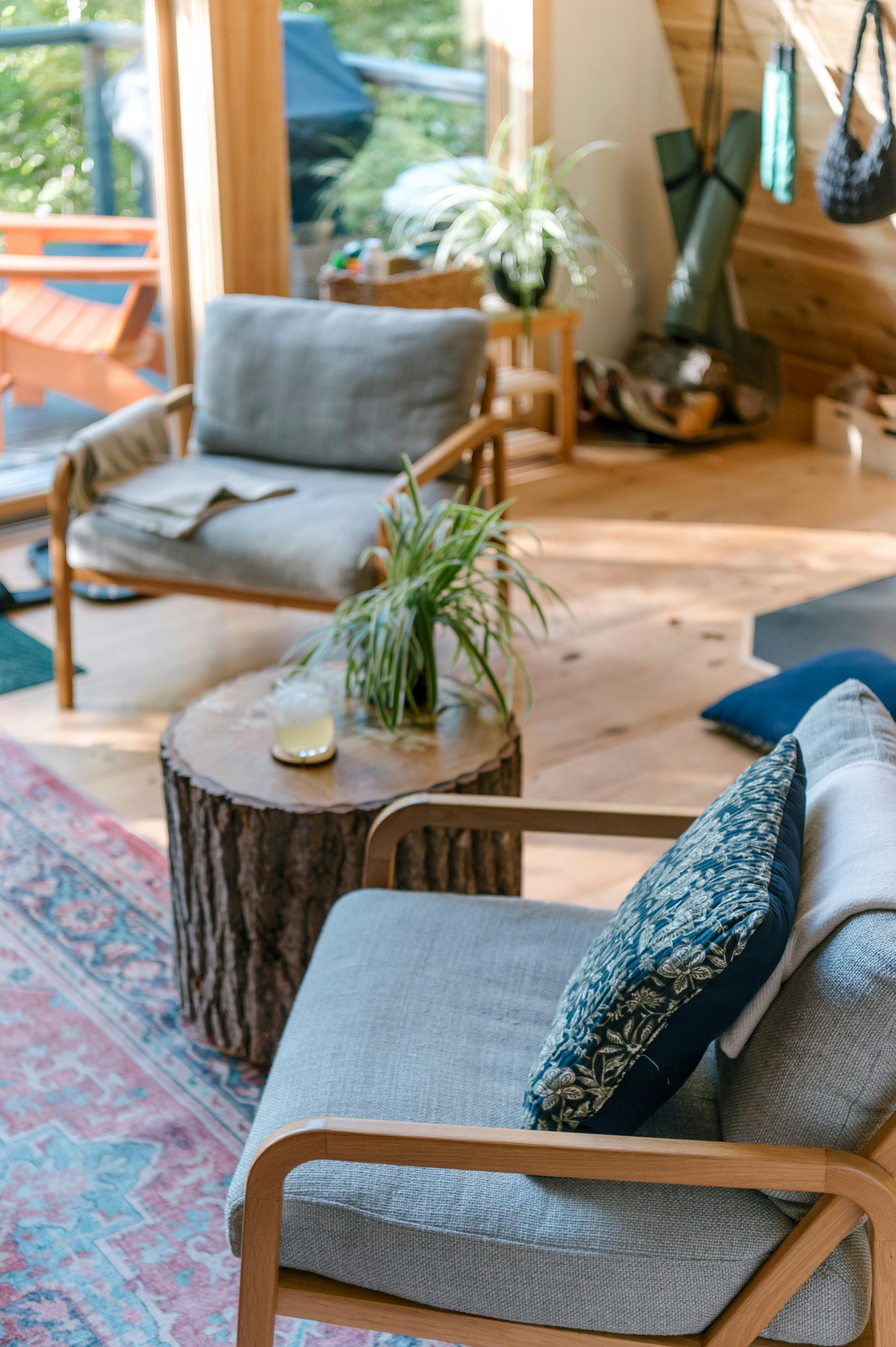 Sunlit Lounge: Cozy Nook with Timber Accents and Greenery