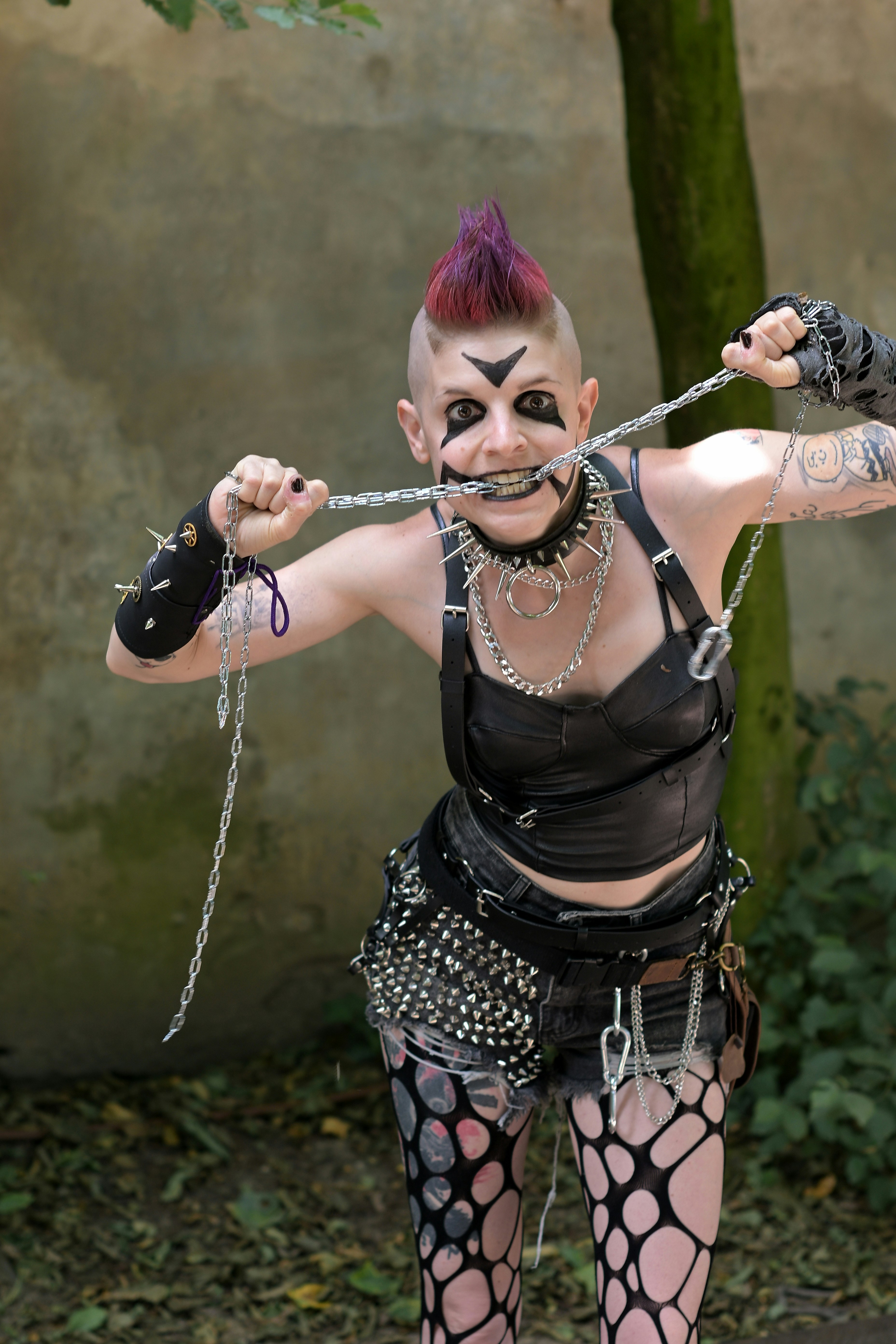 Piercing Pulse: A Punk Sculpture Clutching Chains in the Garden