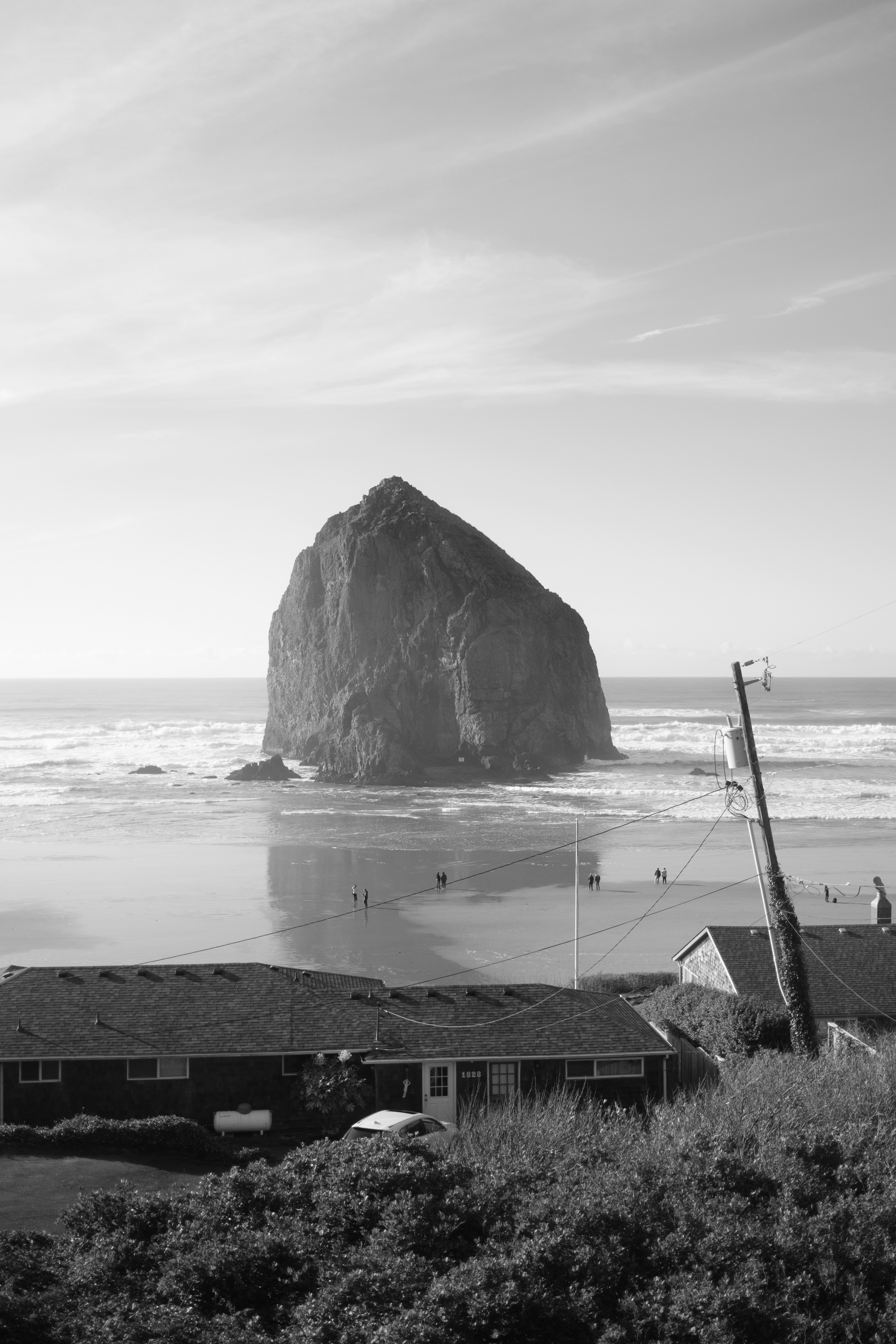 Sea stack in perspective: a quiet coastal scene from a hillside village