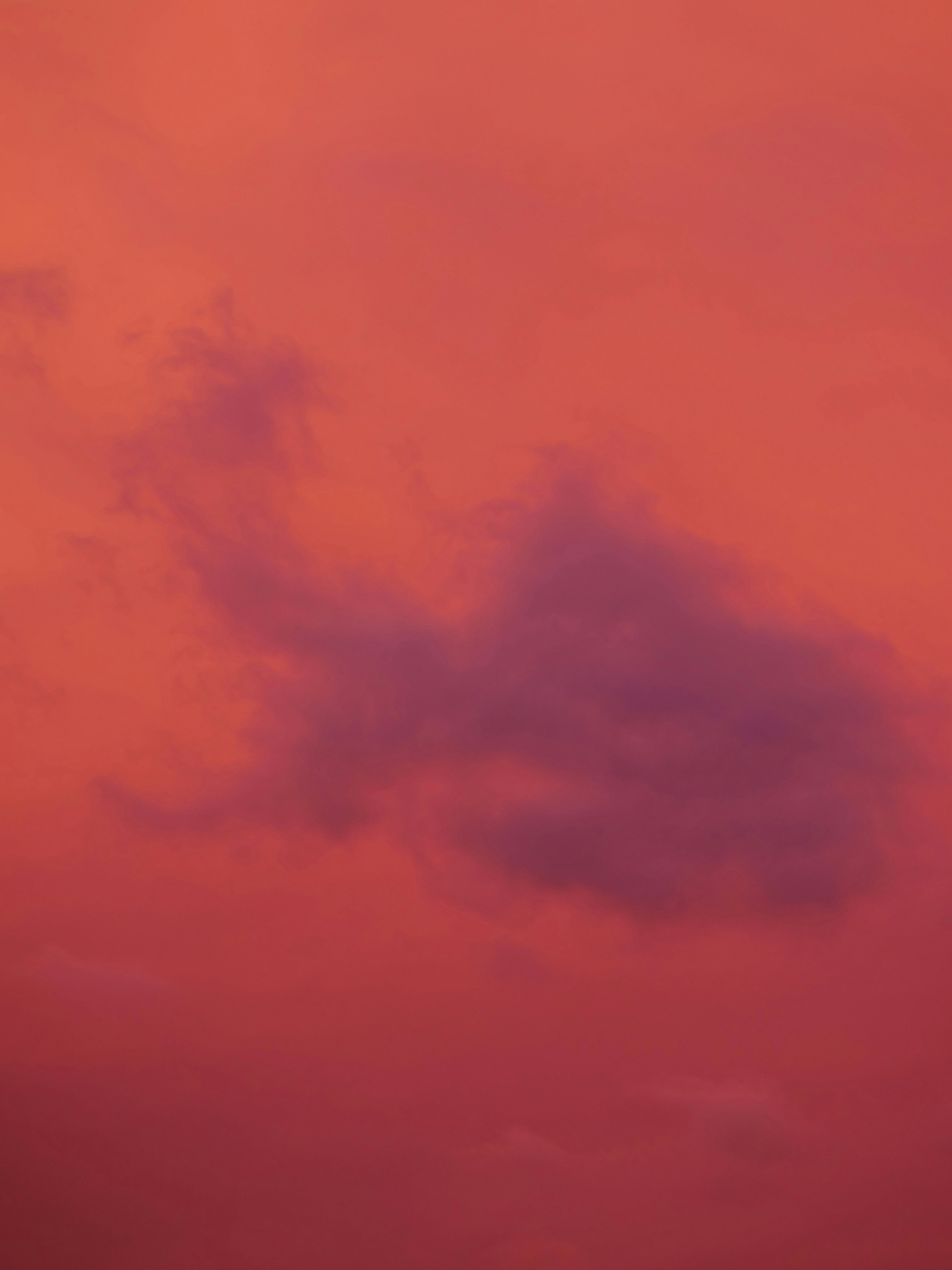 Ember Sky: A Silent Sunset Over a Violet Cloud