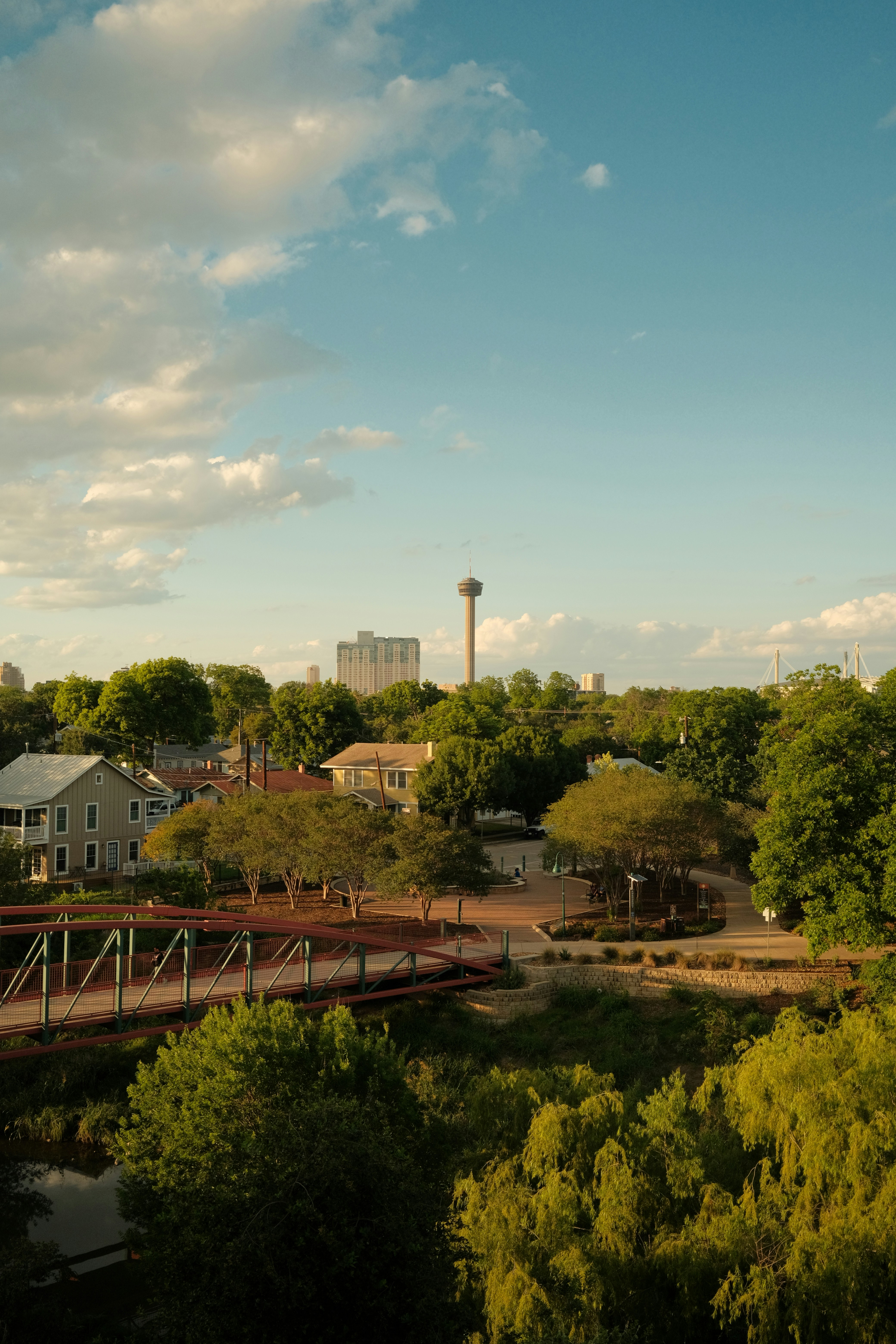 Urban Horizon: The Tower and Riverside Flats at Golden Hour