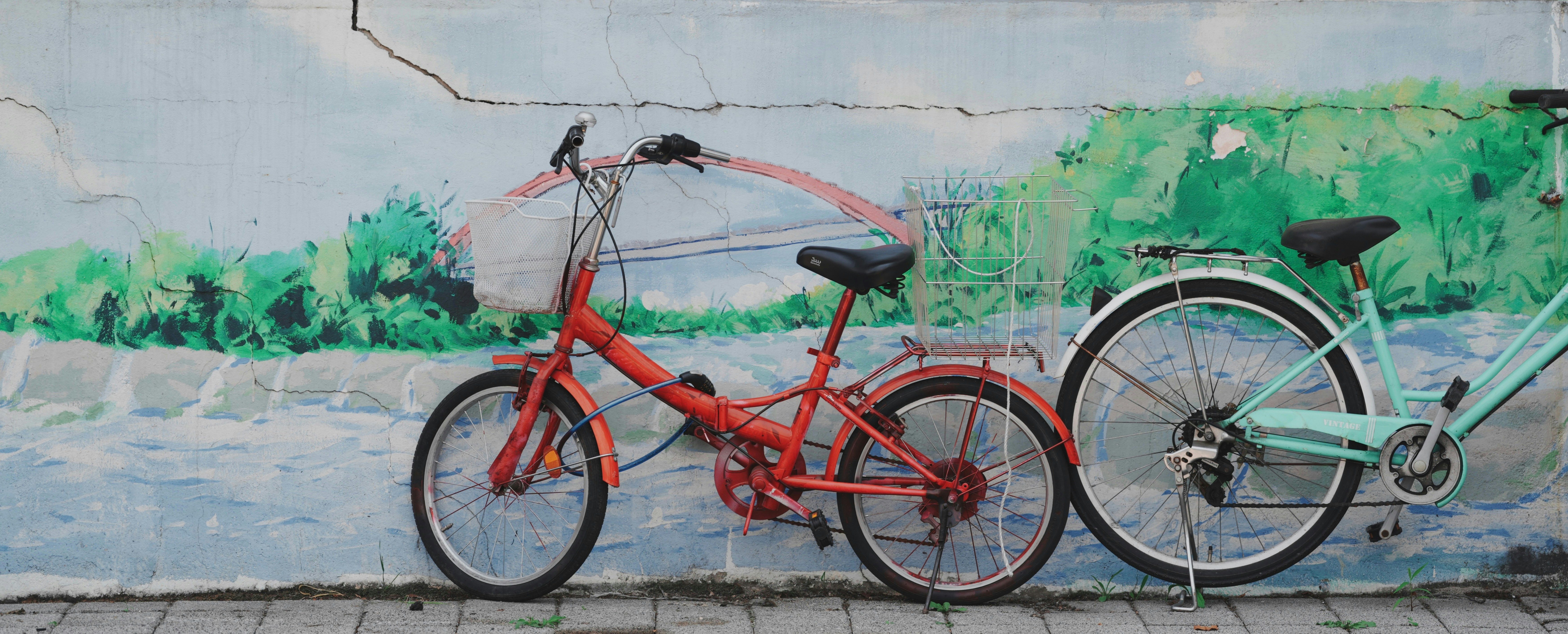 Two-Tone Velos: A Red Memory Resting Against a Painted Wall