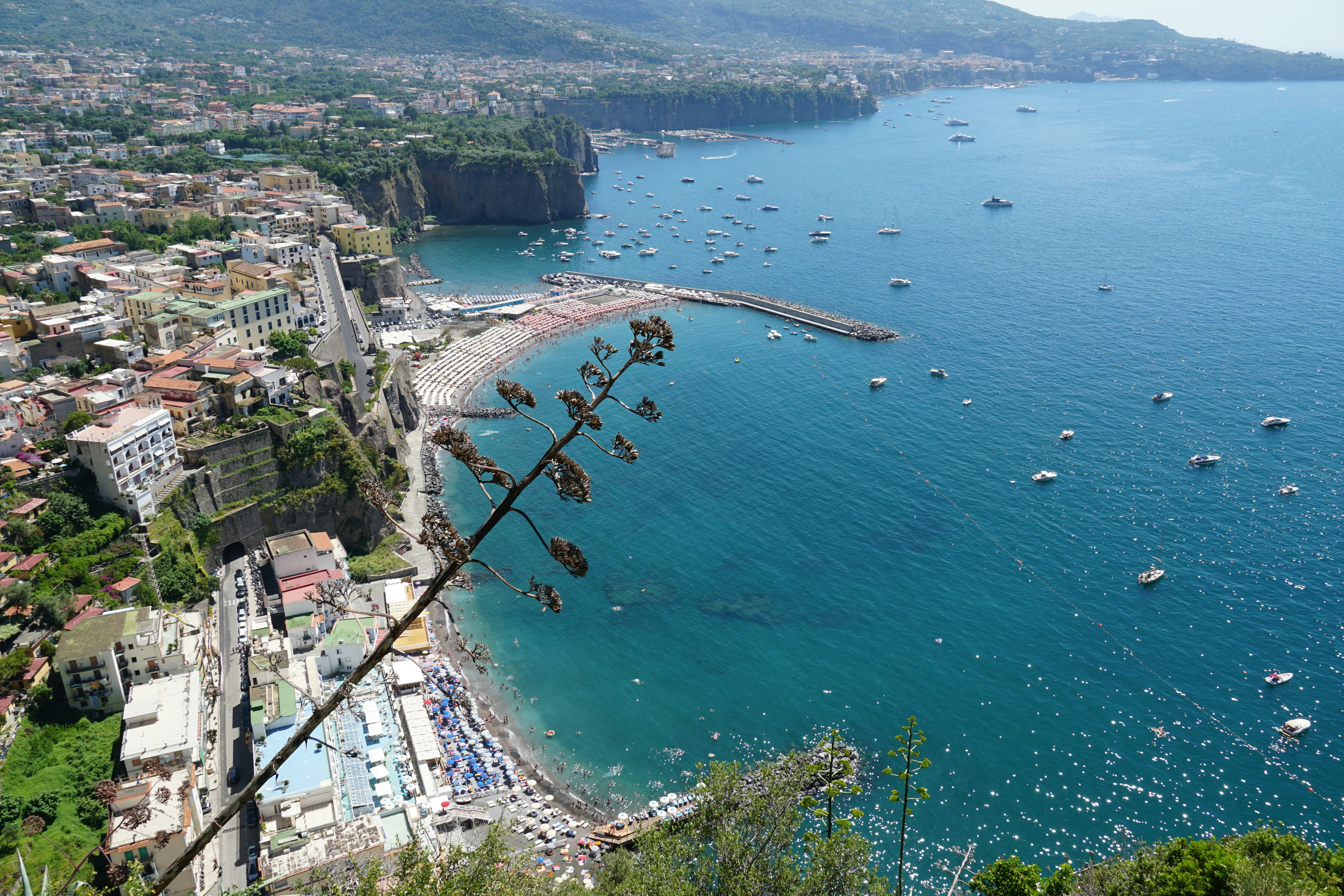 Clifftop Coastal Village Overlooking Turquoise Harbor
