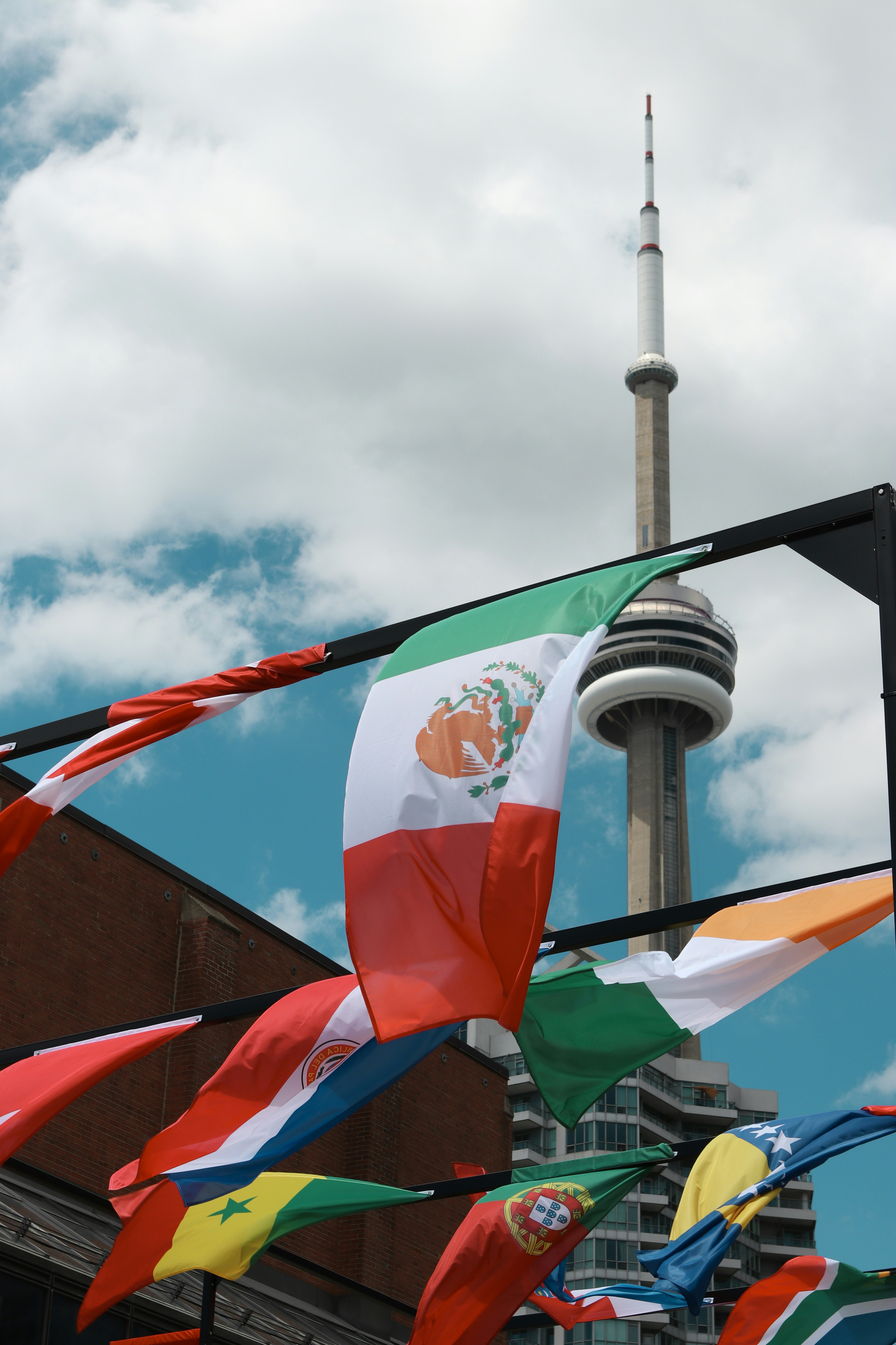 Flags in Flight as Toronto Tower Elevates the Sky