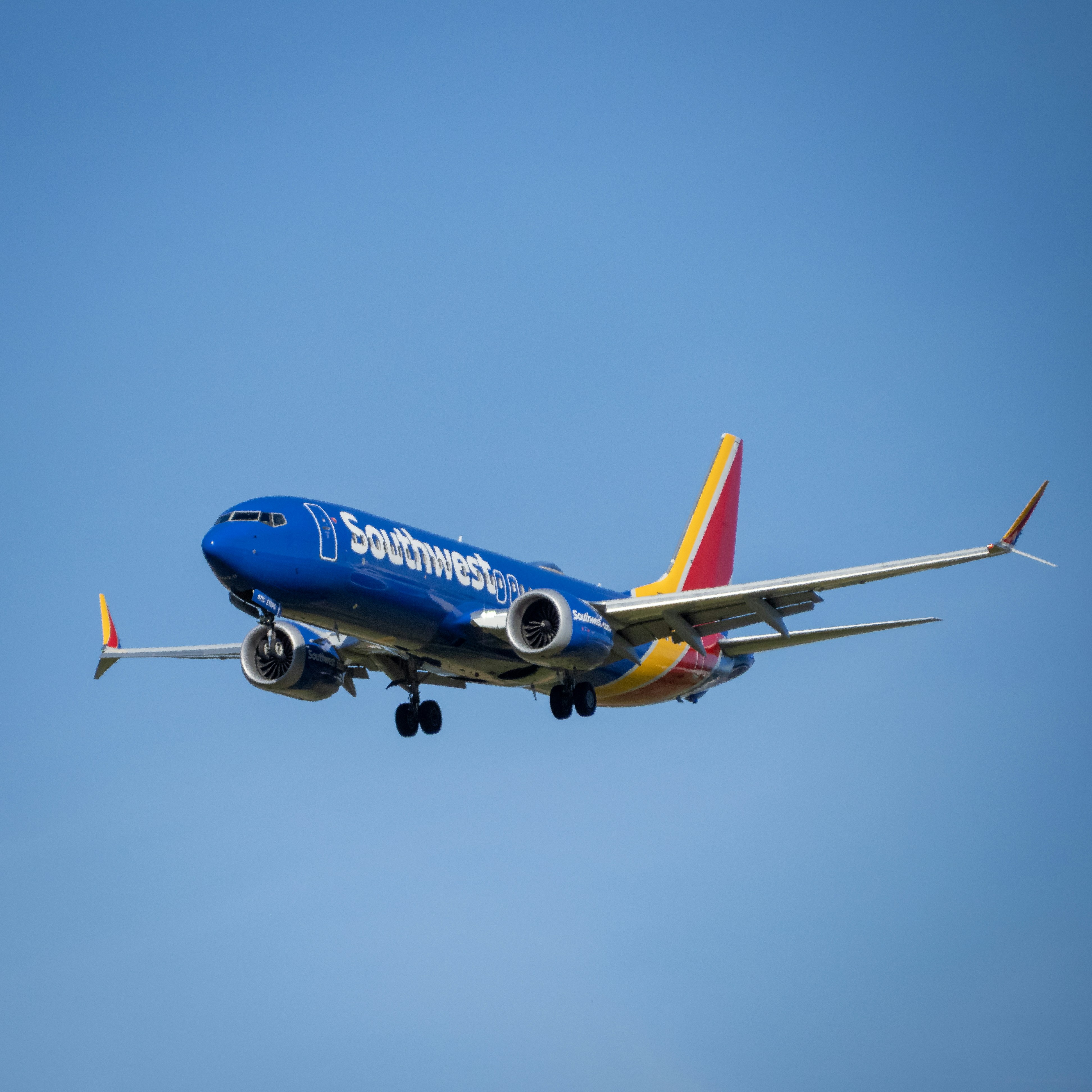 Southwest in Flight: Blue Fuselage Against a Clear Sky