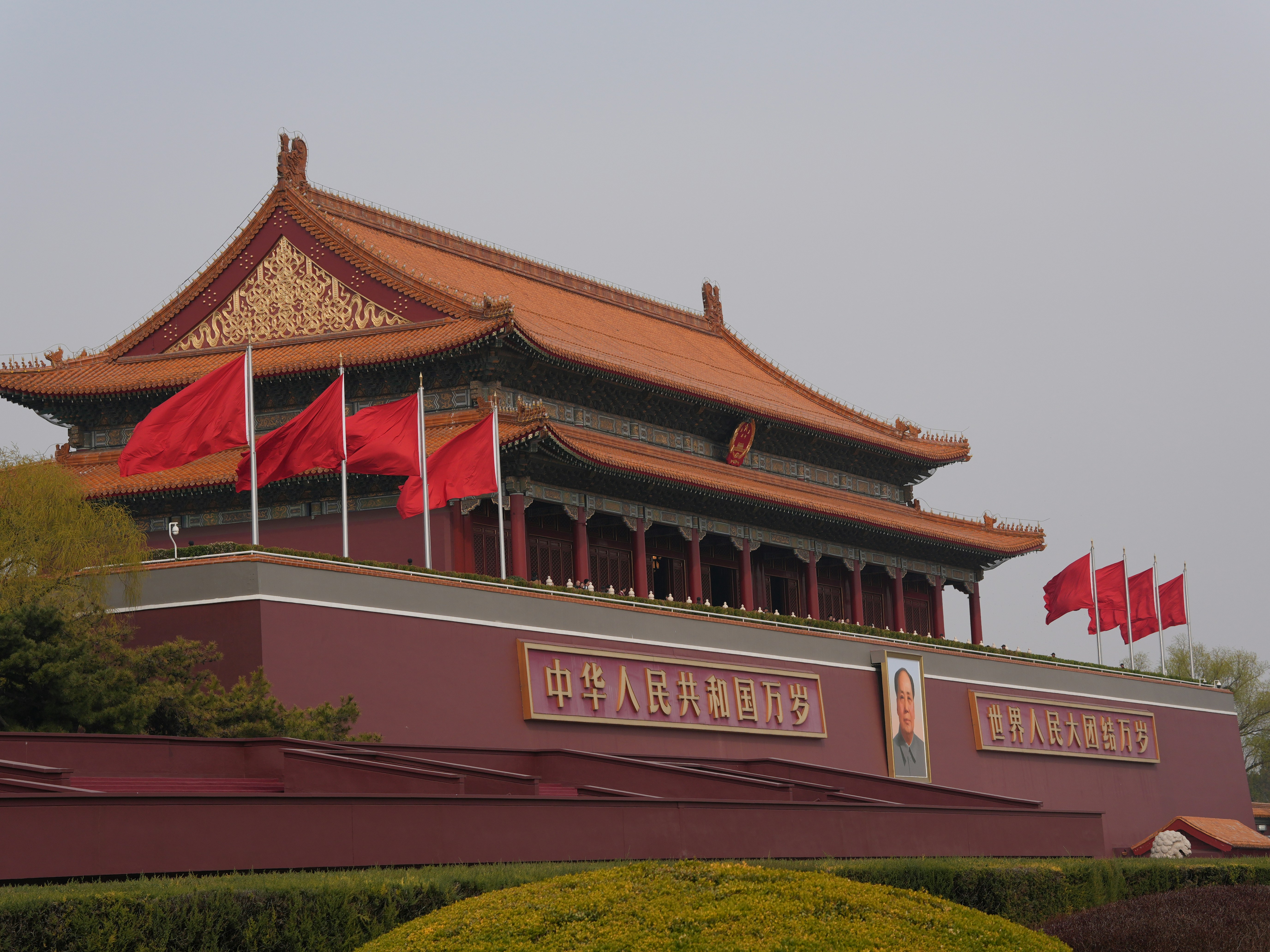 Tiananmen Gate: A Row of Red Flags Under the Heirloom Roof