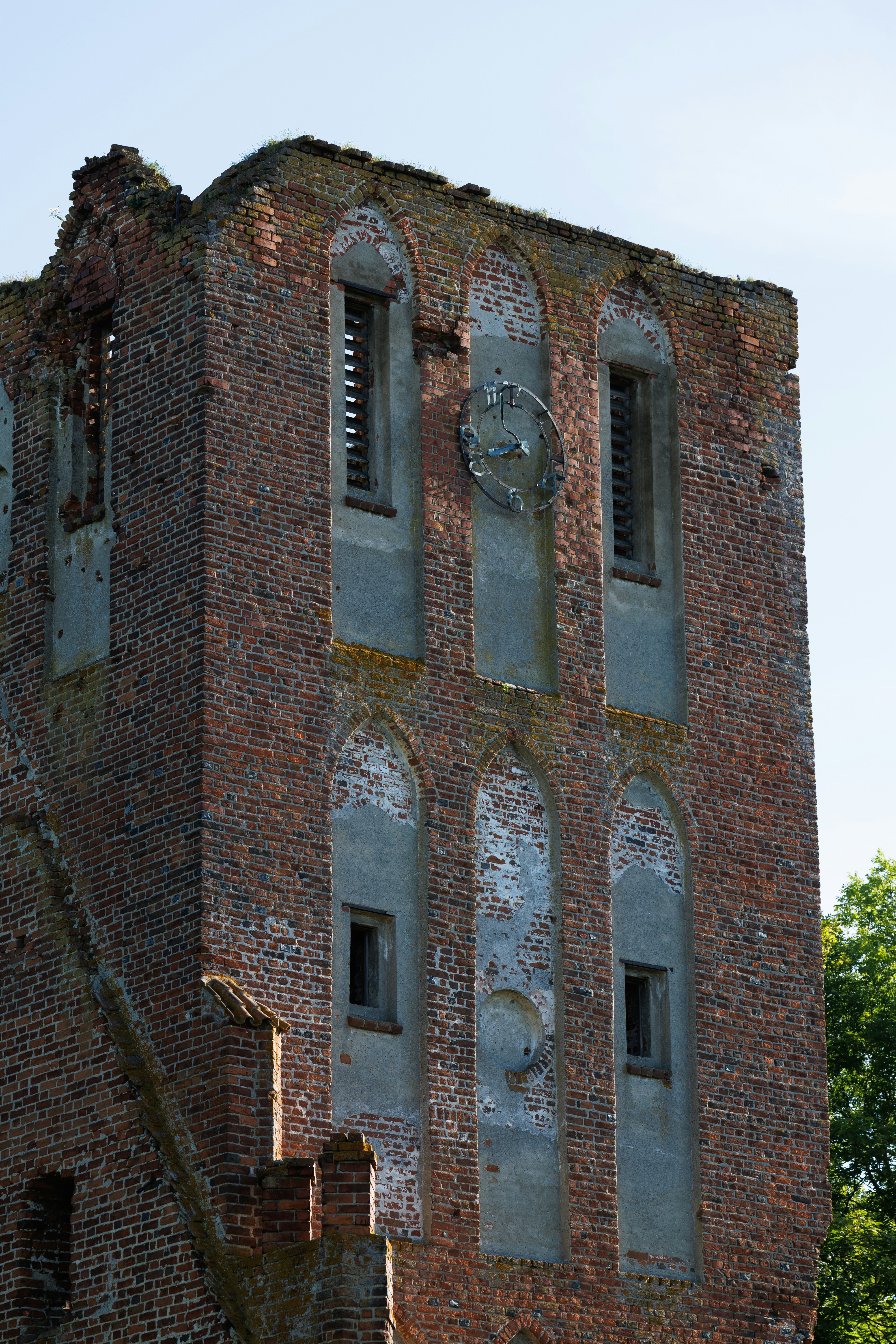 Weathered Brick Bell Tower Reclaimed by Time