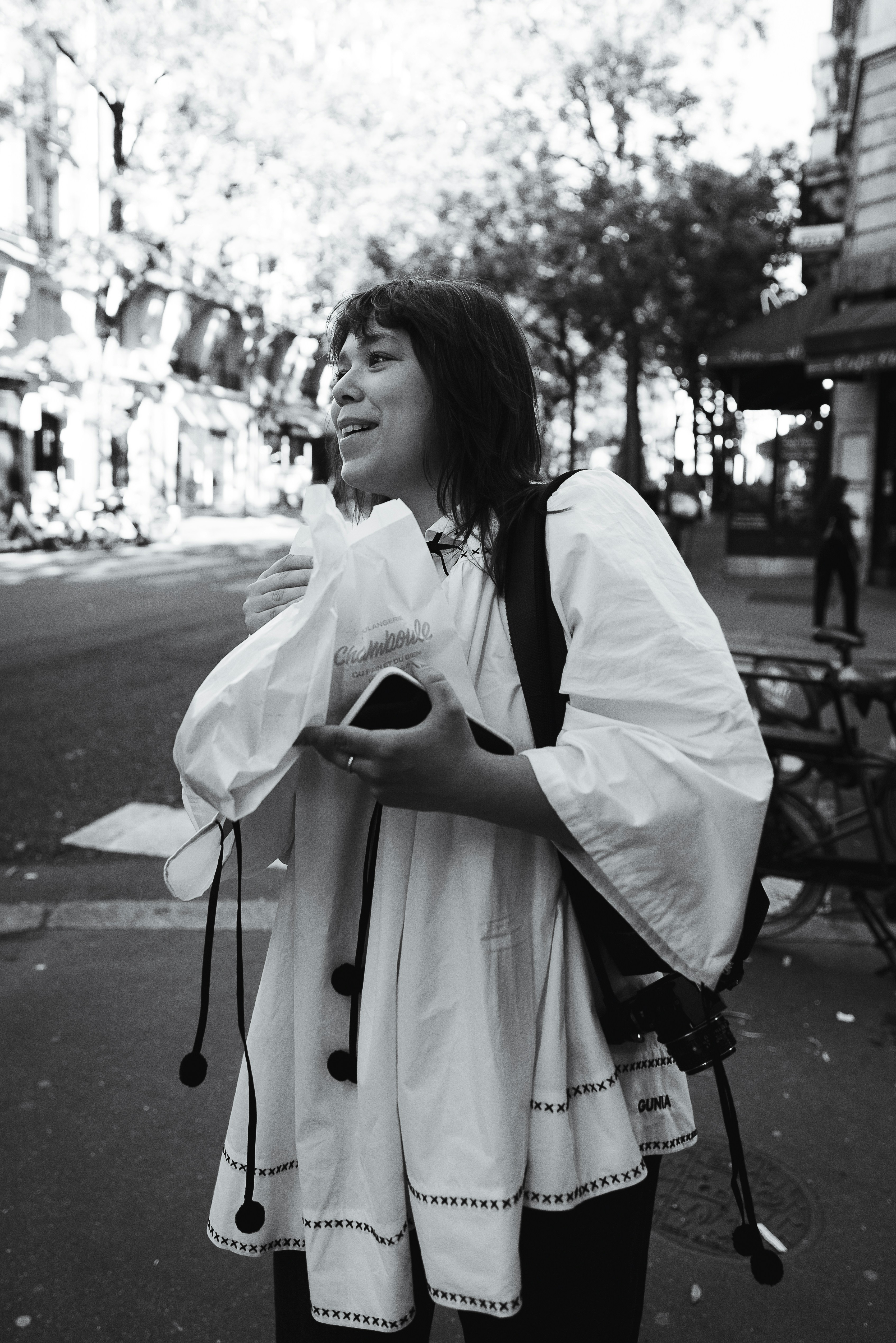Joyful Street Moment: A Sleeved Gathering in the City