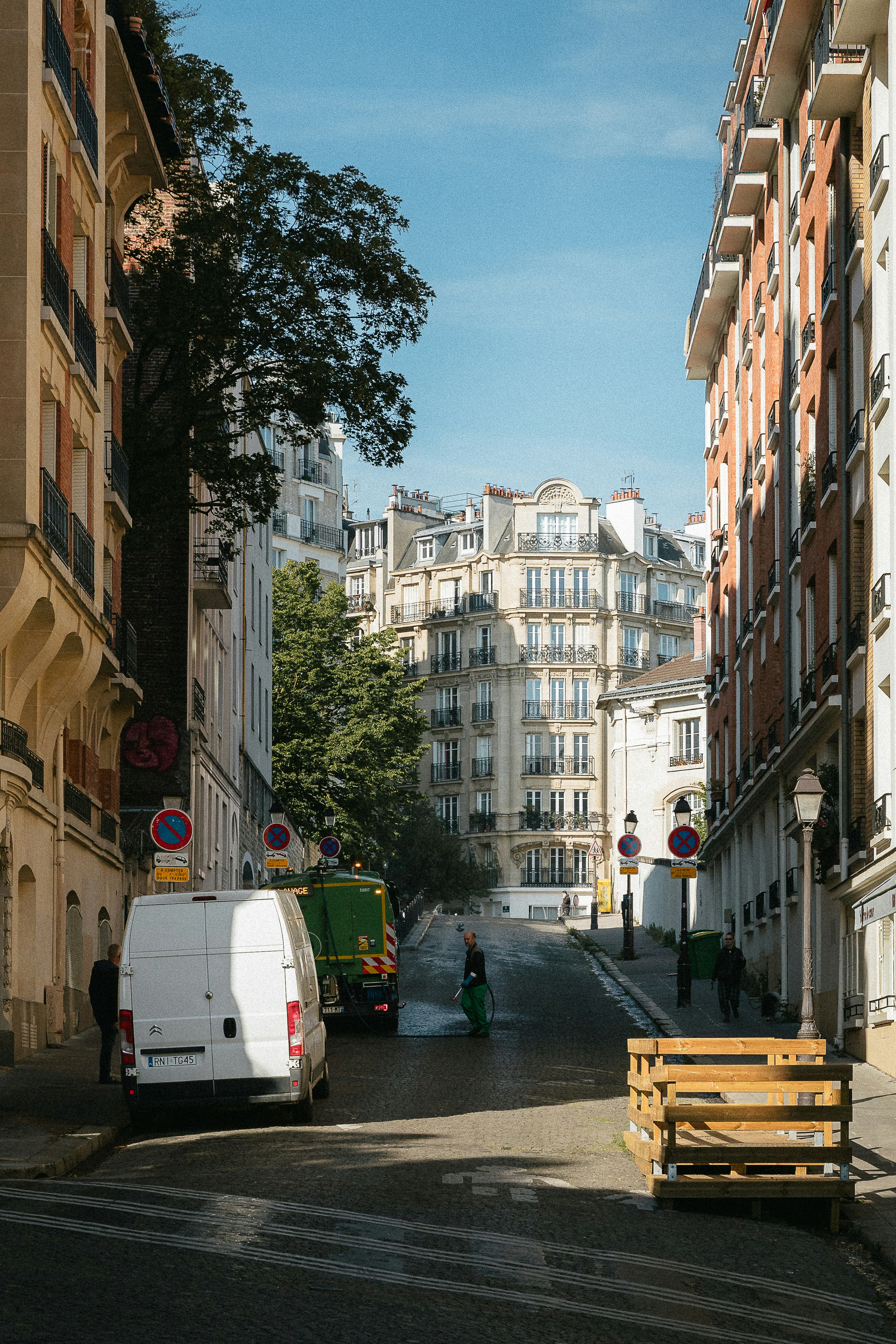 City Street Silhouette: Sunlit Arcades and Quiet Movement