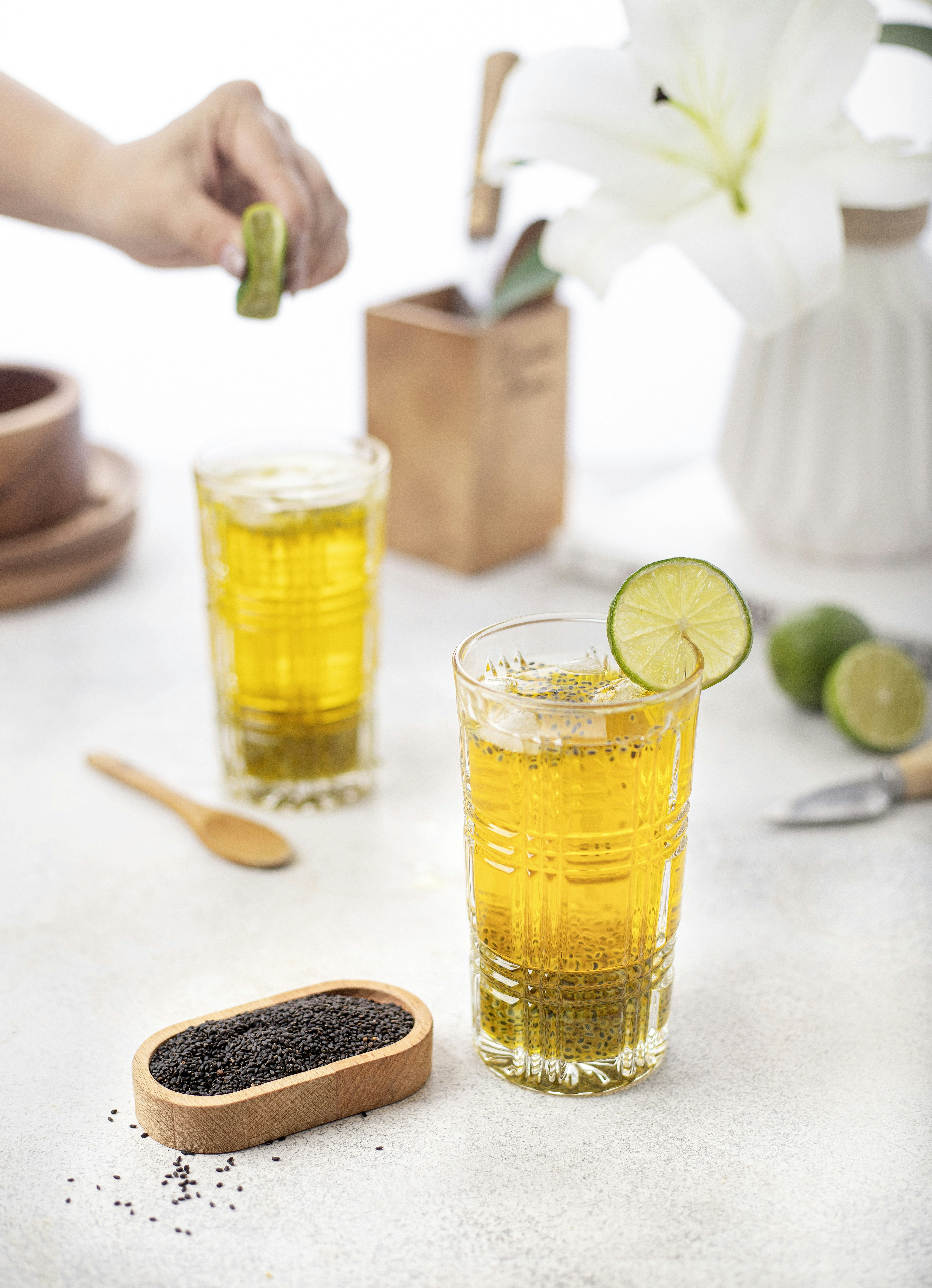 Citrus Glow: Lime Wheels and Golden Elixir on a Bright Kitchen Bar