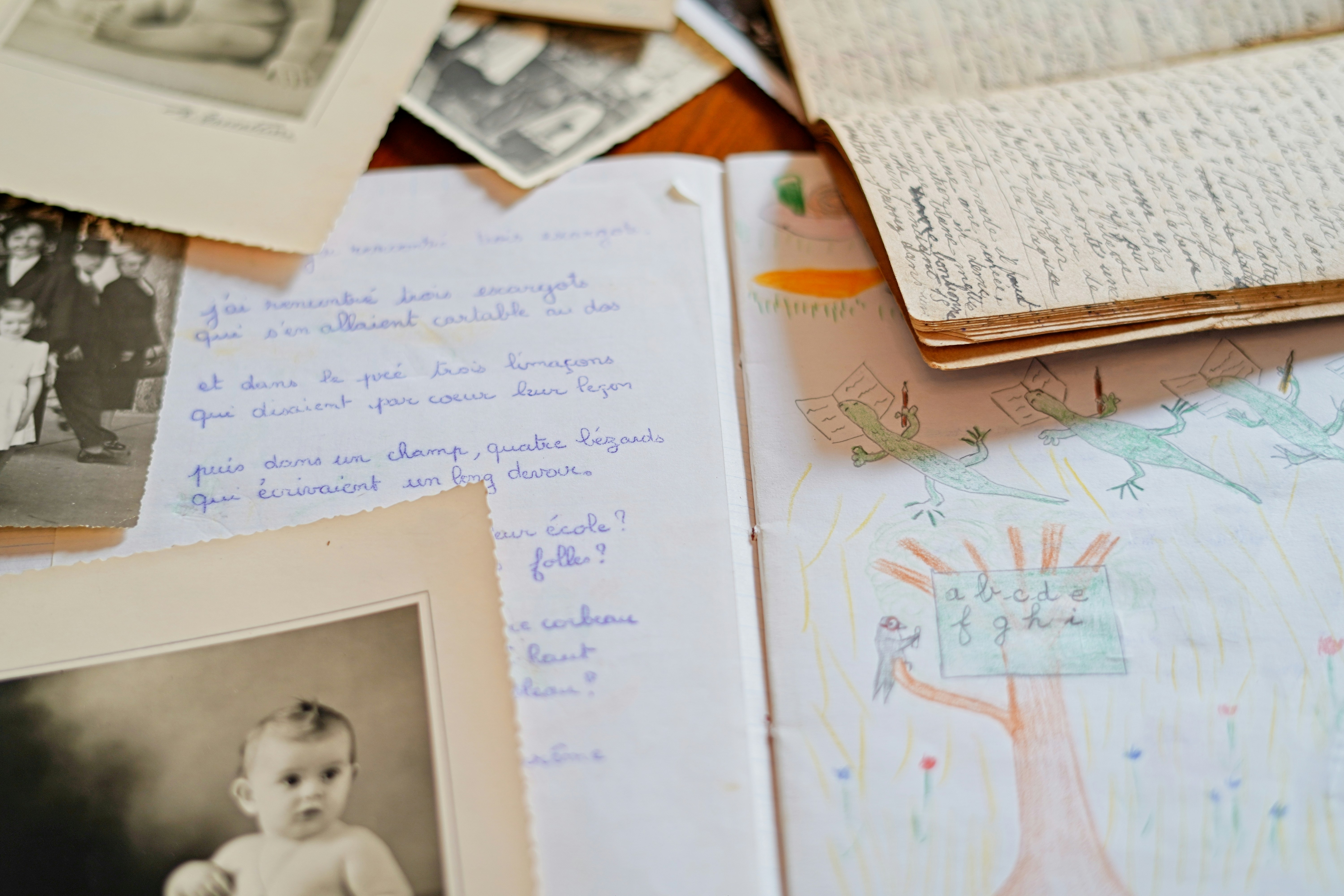 Forgotten Letters and Family Photos Spread Across a Desk