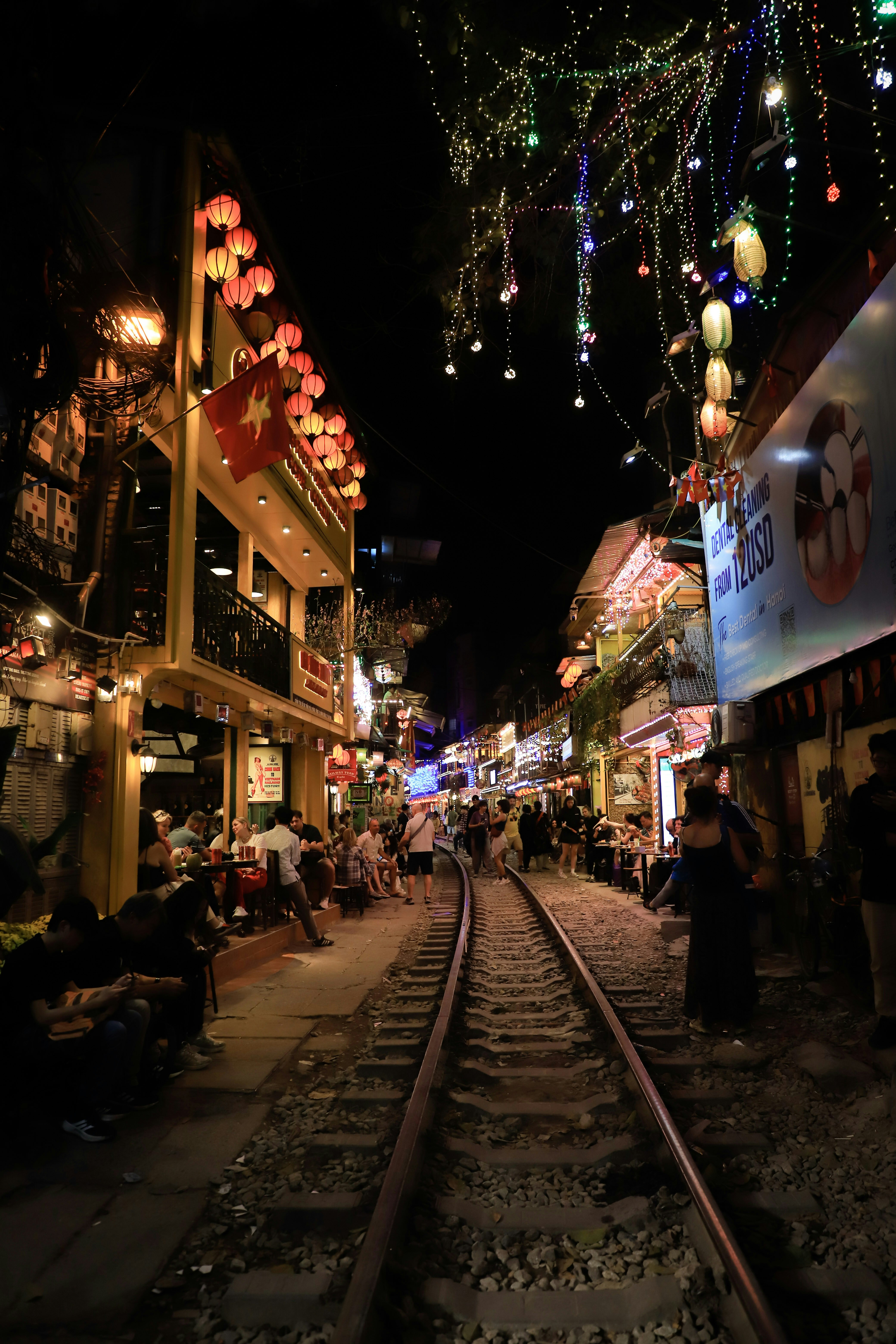 Railway Through a Lantern-Lit Night Market