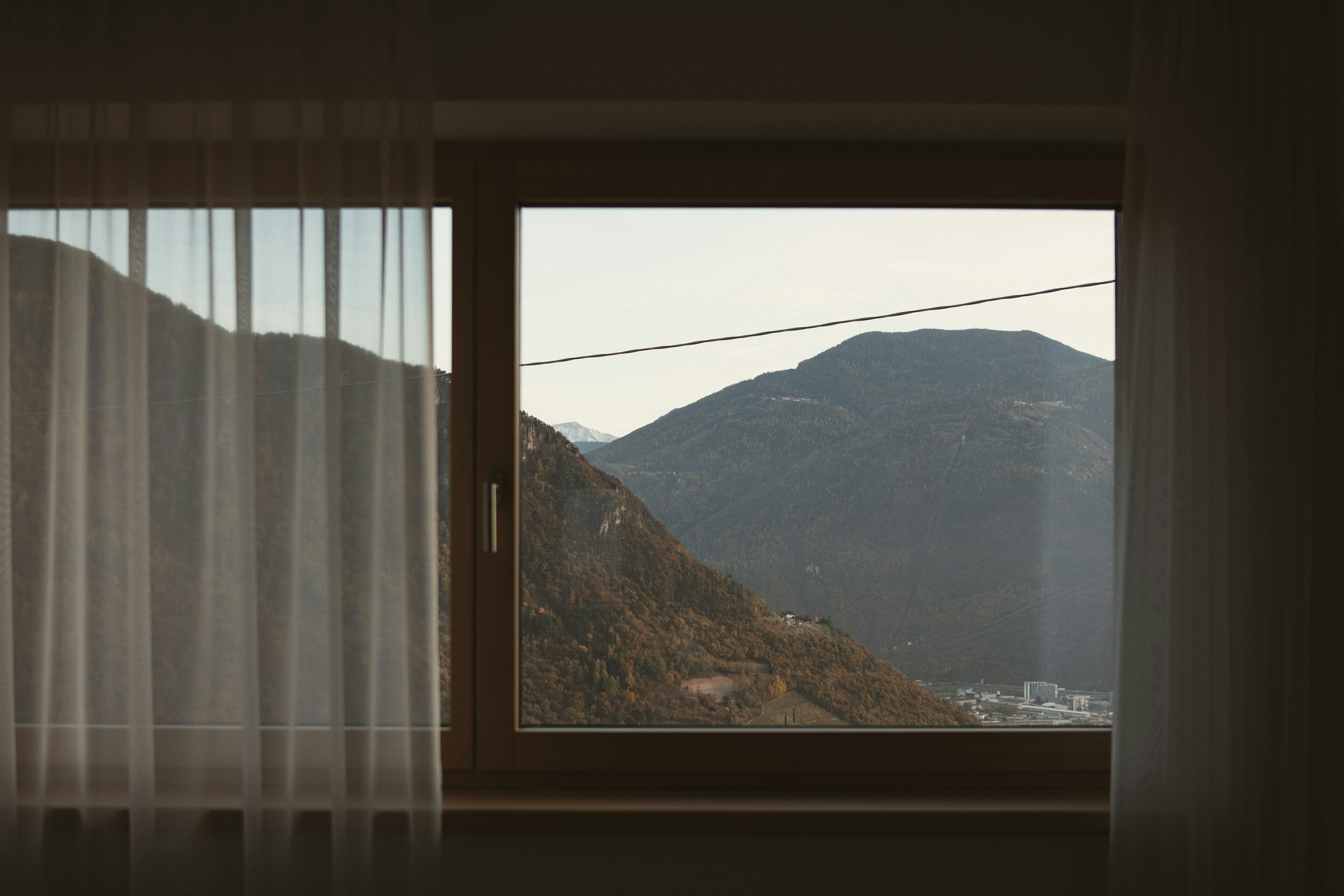 Hushed Valley Through a Framed Window