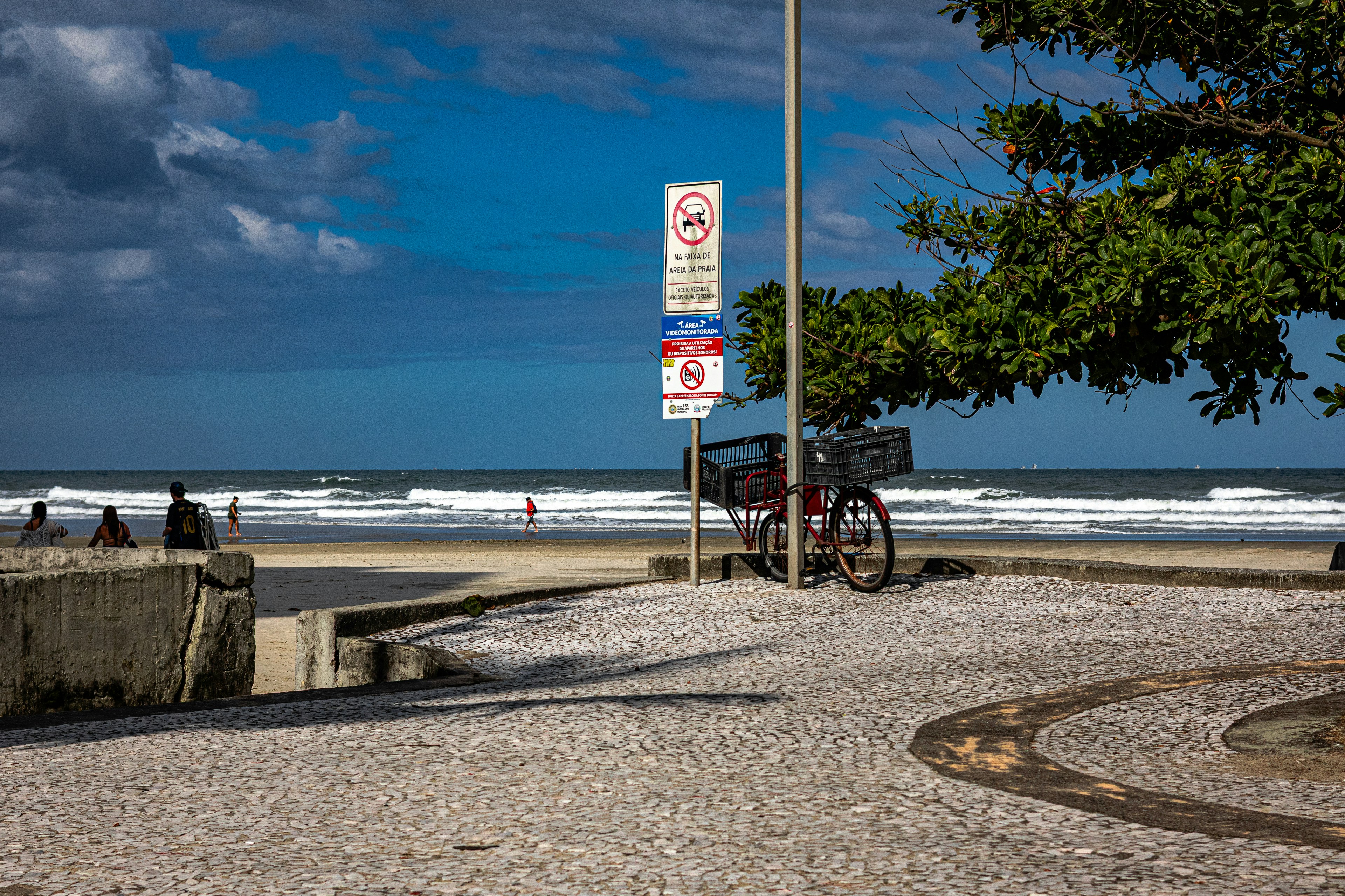 Seaside Promenade: A Quiet Moment by the Cobble and Wheel