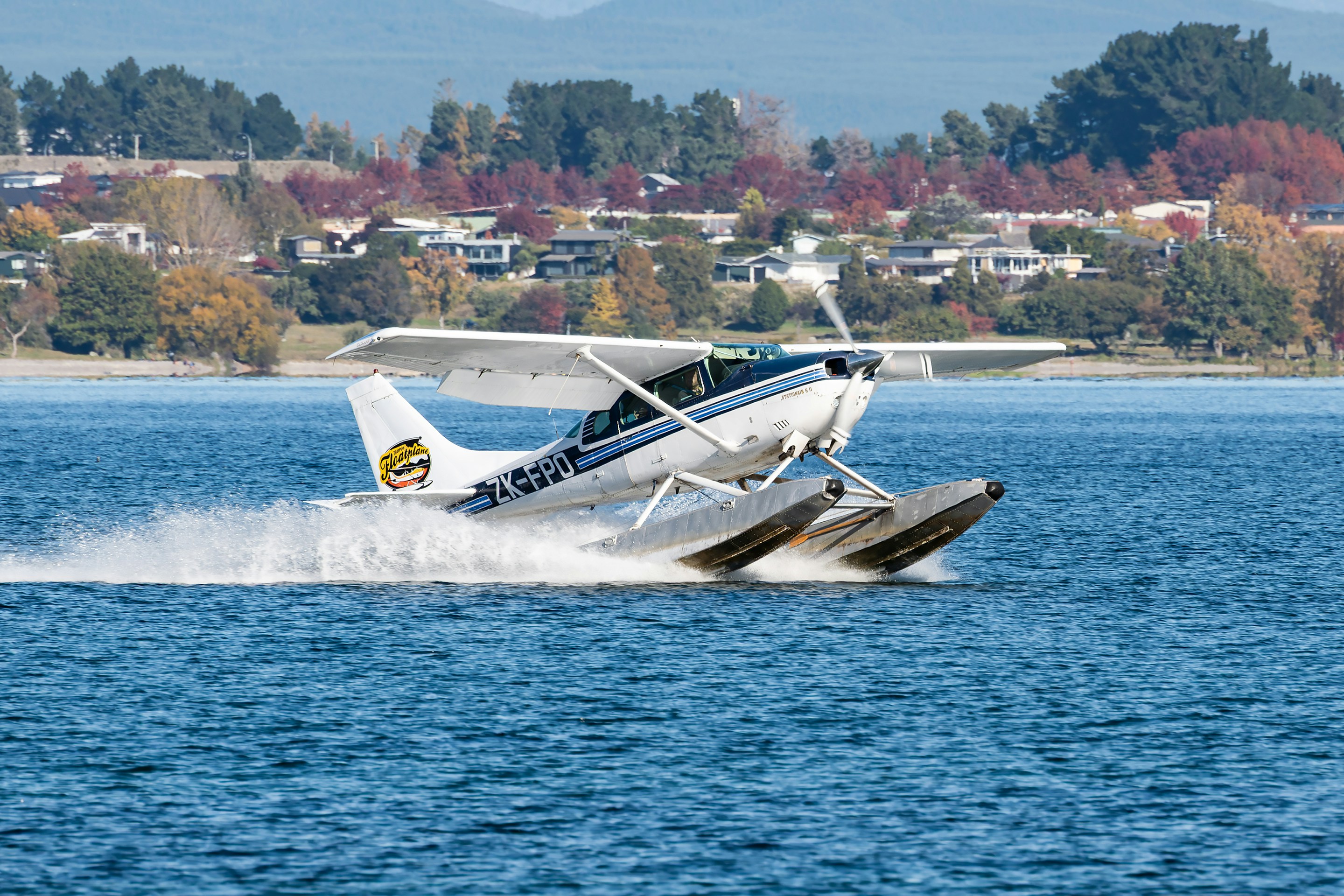 Seaplane Burst: Leaving a Wake Through Calm Blue