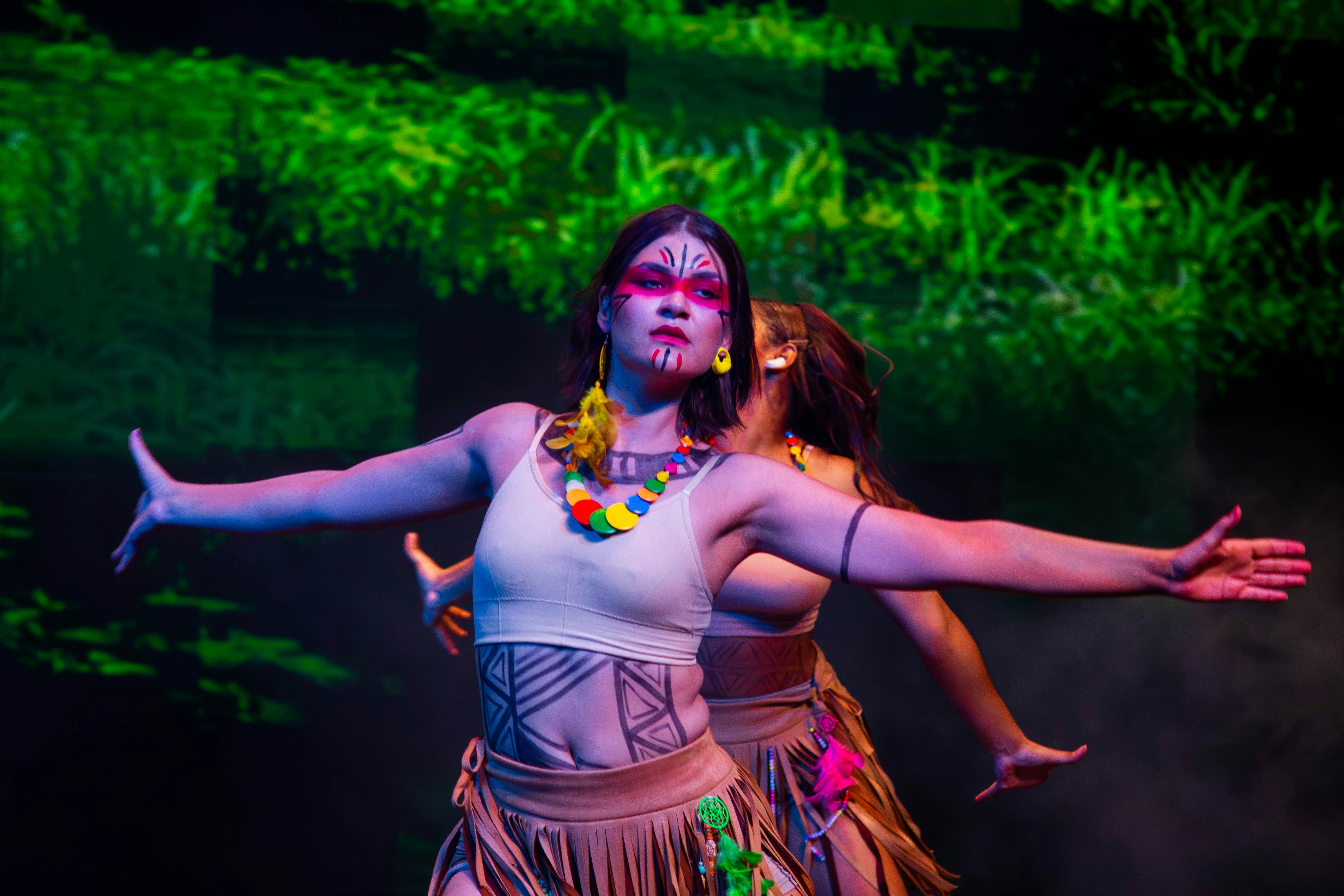 Harmonic Movements: A Dancer in Neon-Opal Lights