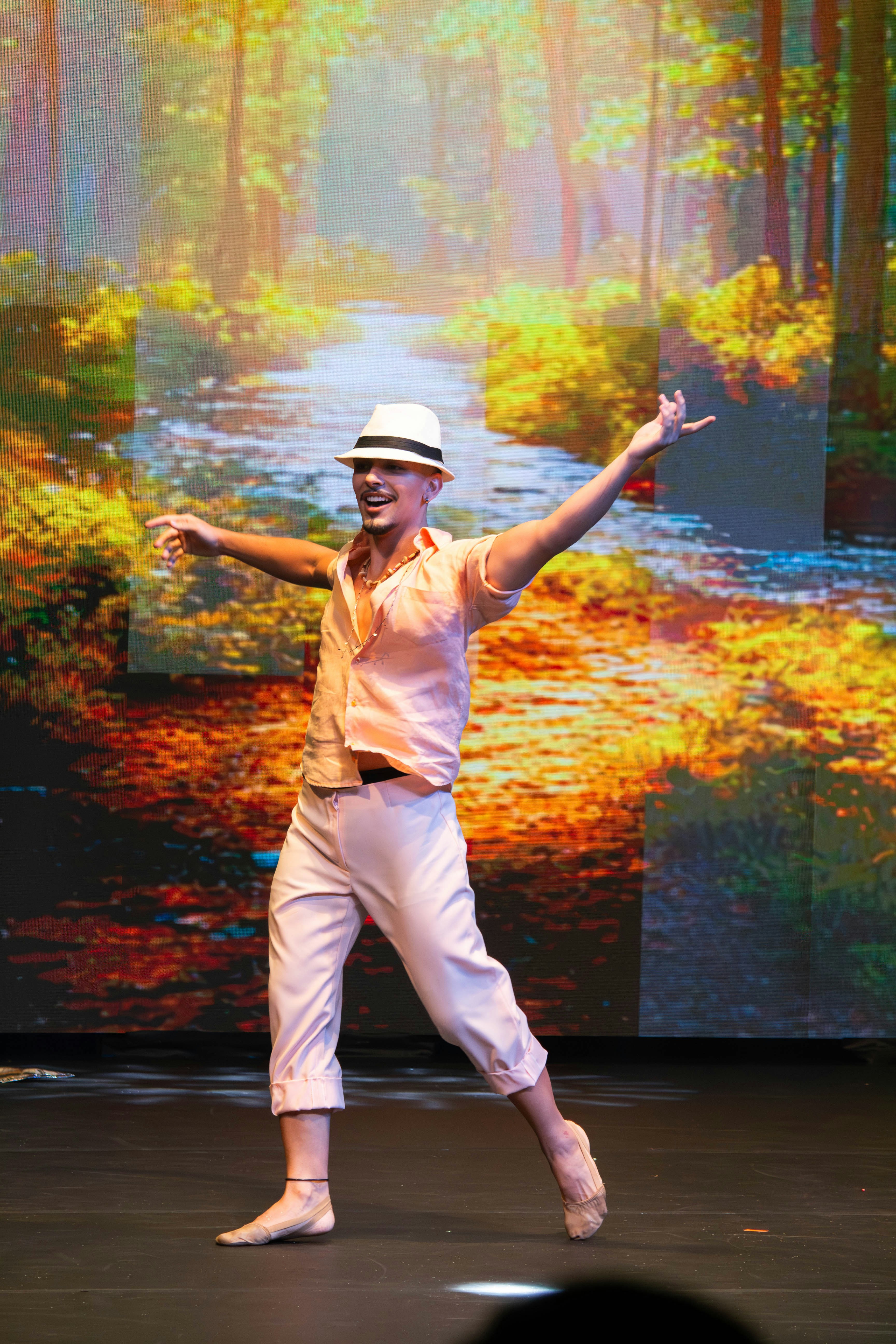 Dance of Autumn Light: Solo Performer in a Colorful Backdrop