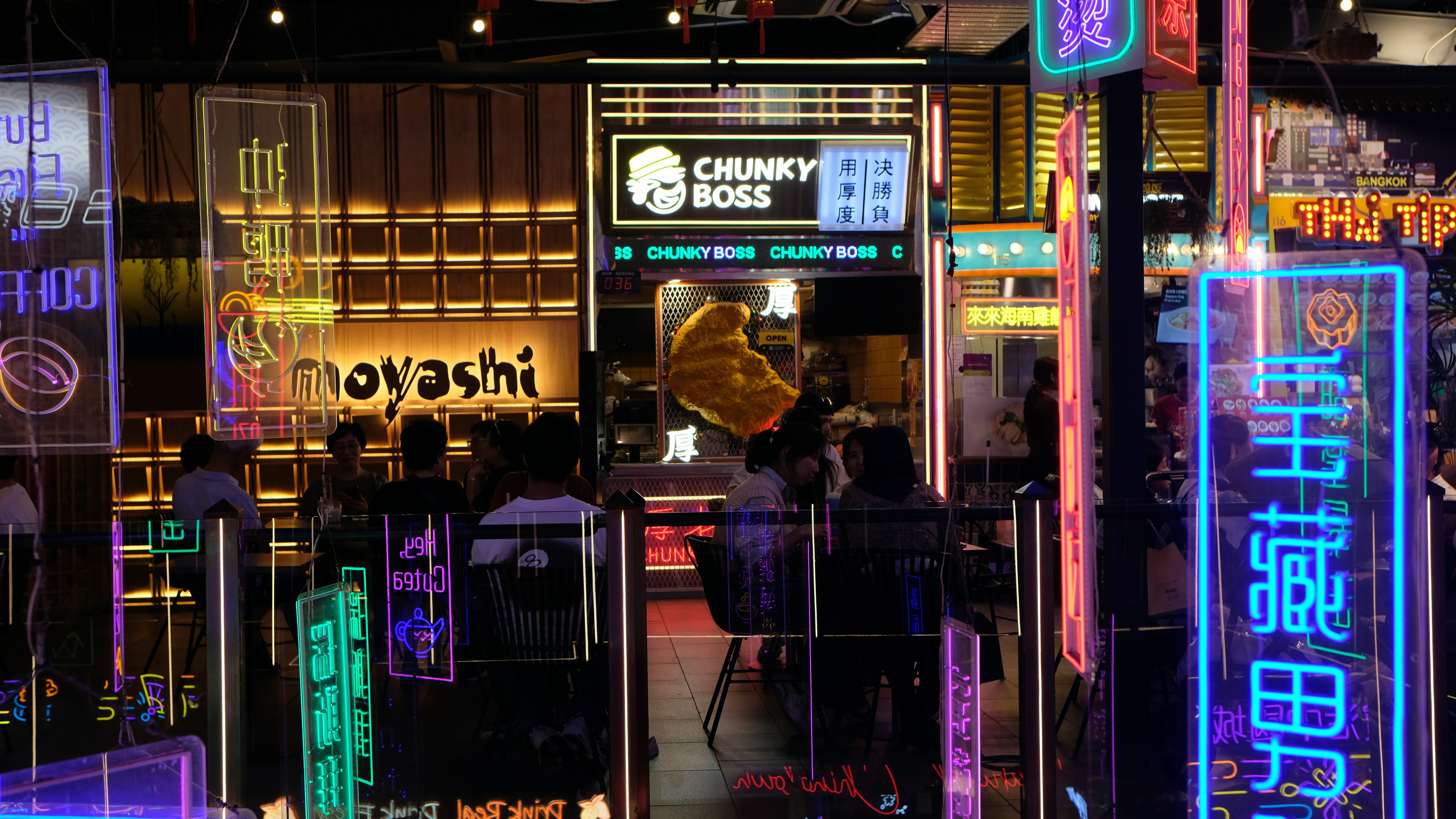 Neon Alleyway: Crowd and Menu Boards in a Bustling Night Market