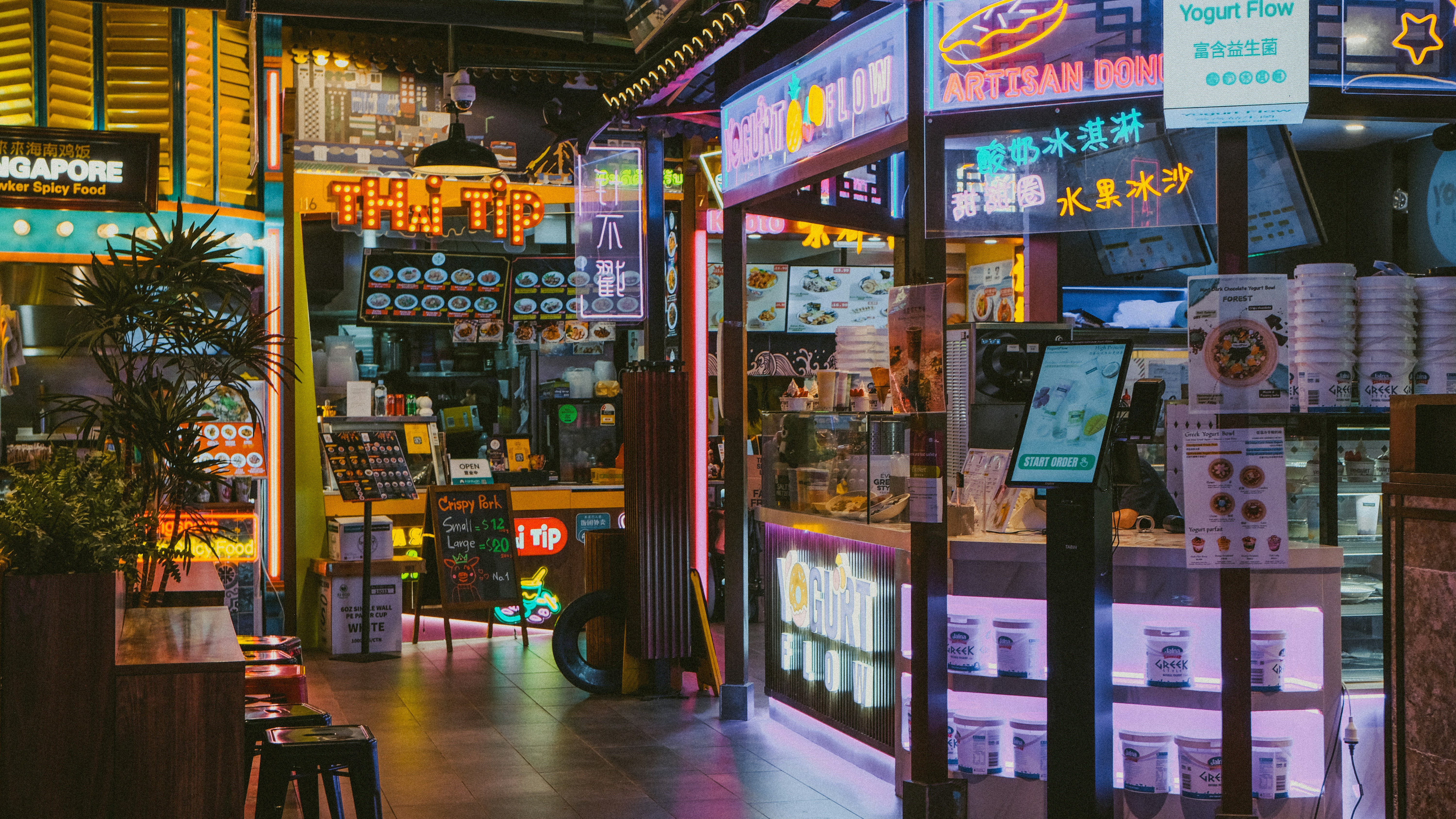 Neon Alleyway: A Bustle of Signage and Steam