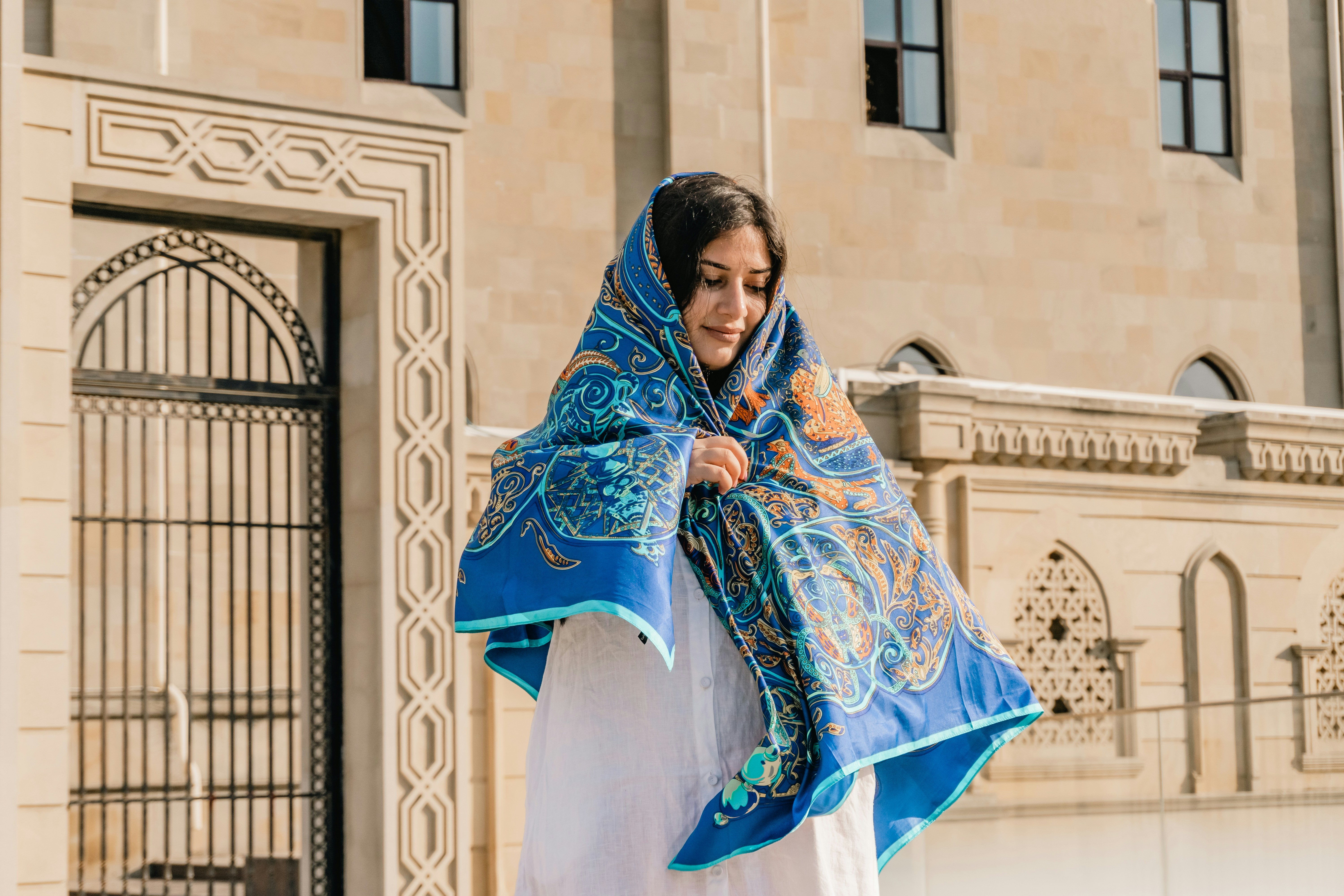 Silk in the Sun: A Portrait Beneath a Blue Shawl