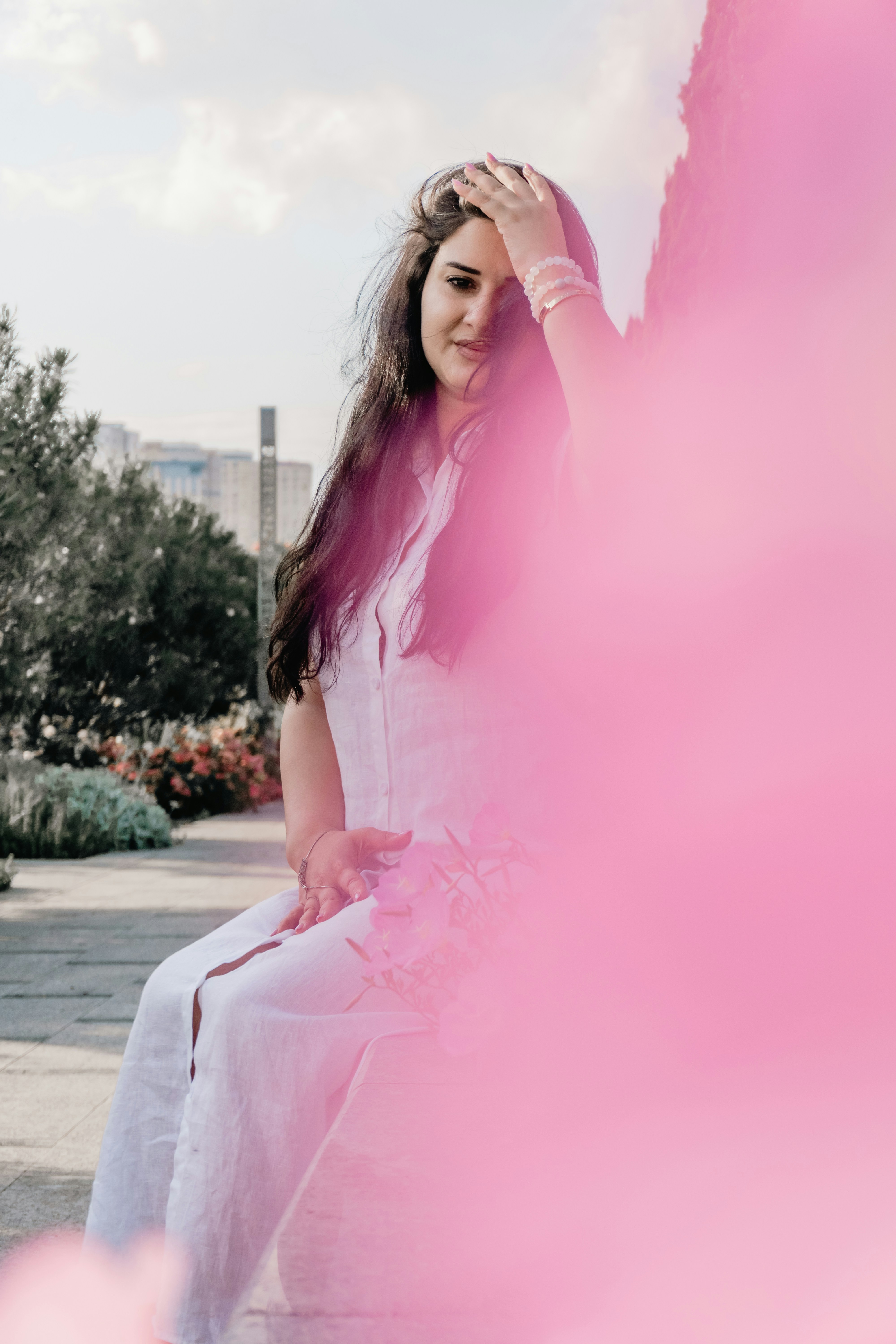 Soft Portrait in Bloom: A Quiet Moment with Pink Haze