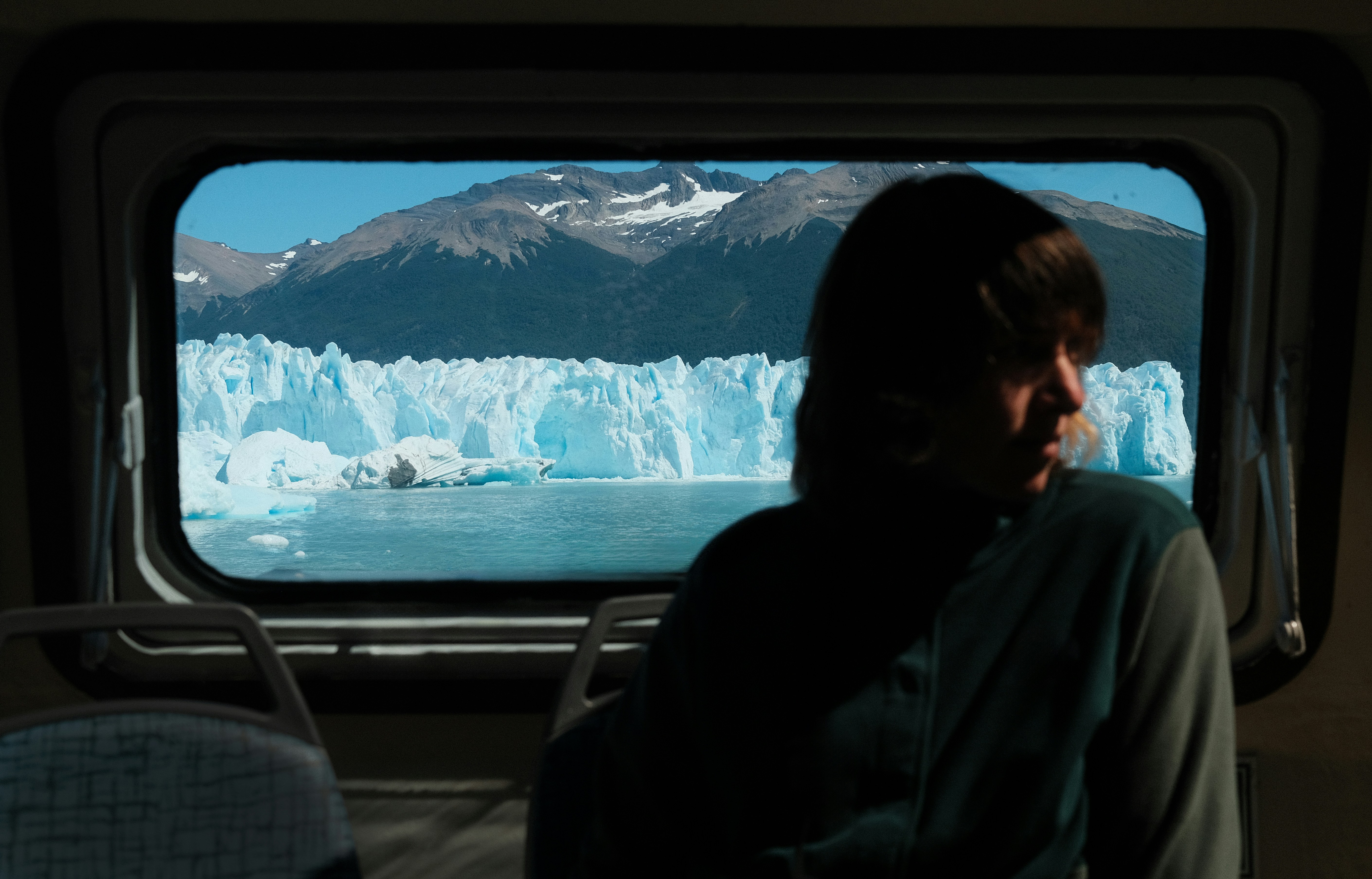 Glacier through the Window: Quiet Contrast of Passenger and Ice