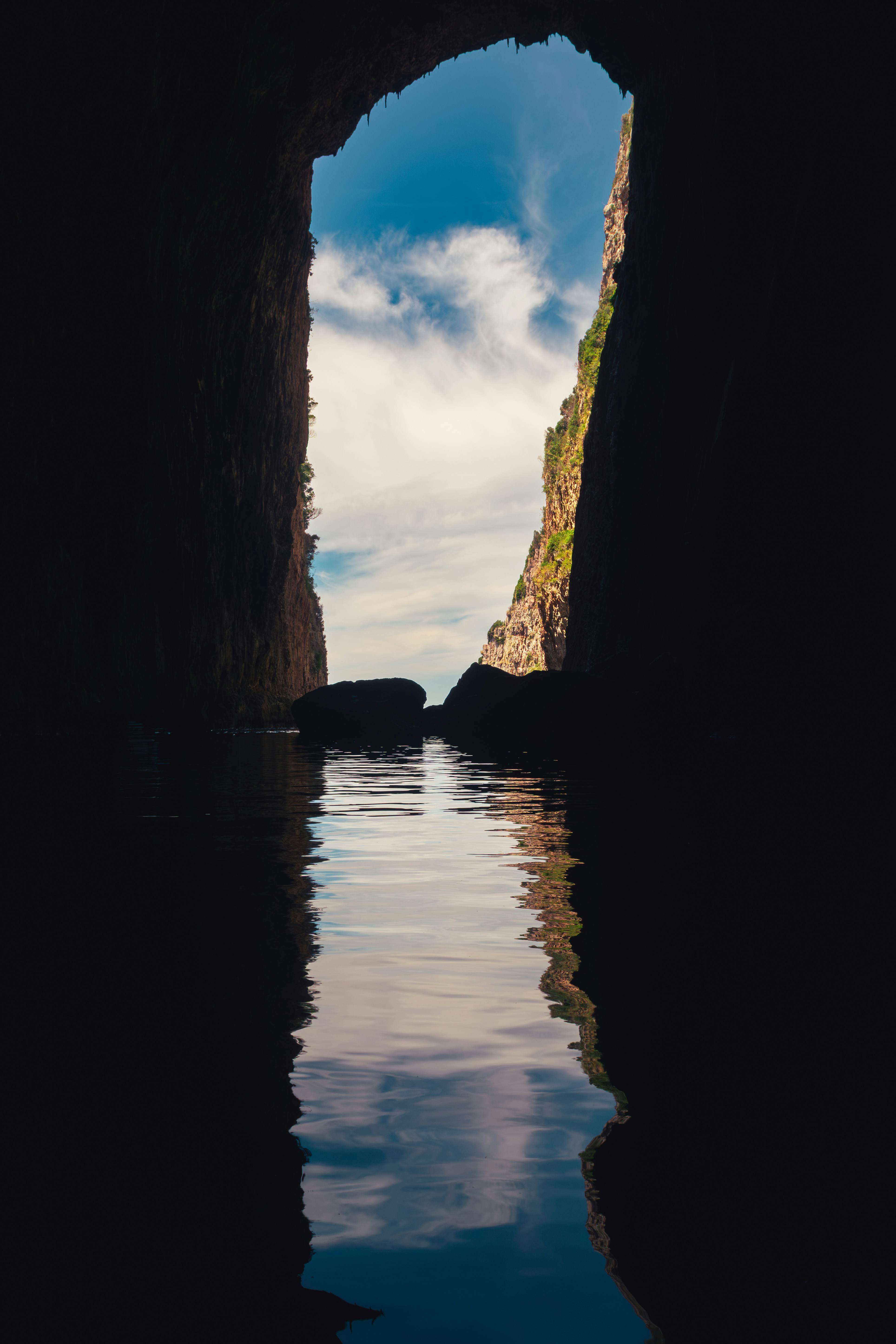 Cavern Window to the Sky: Lightpierced Cliff Plateau