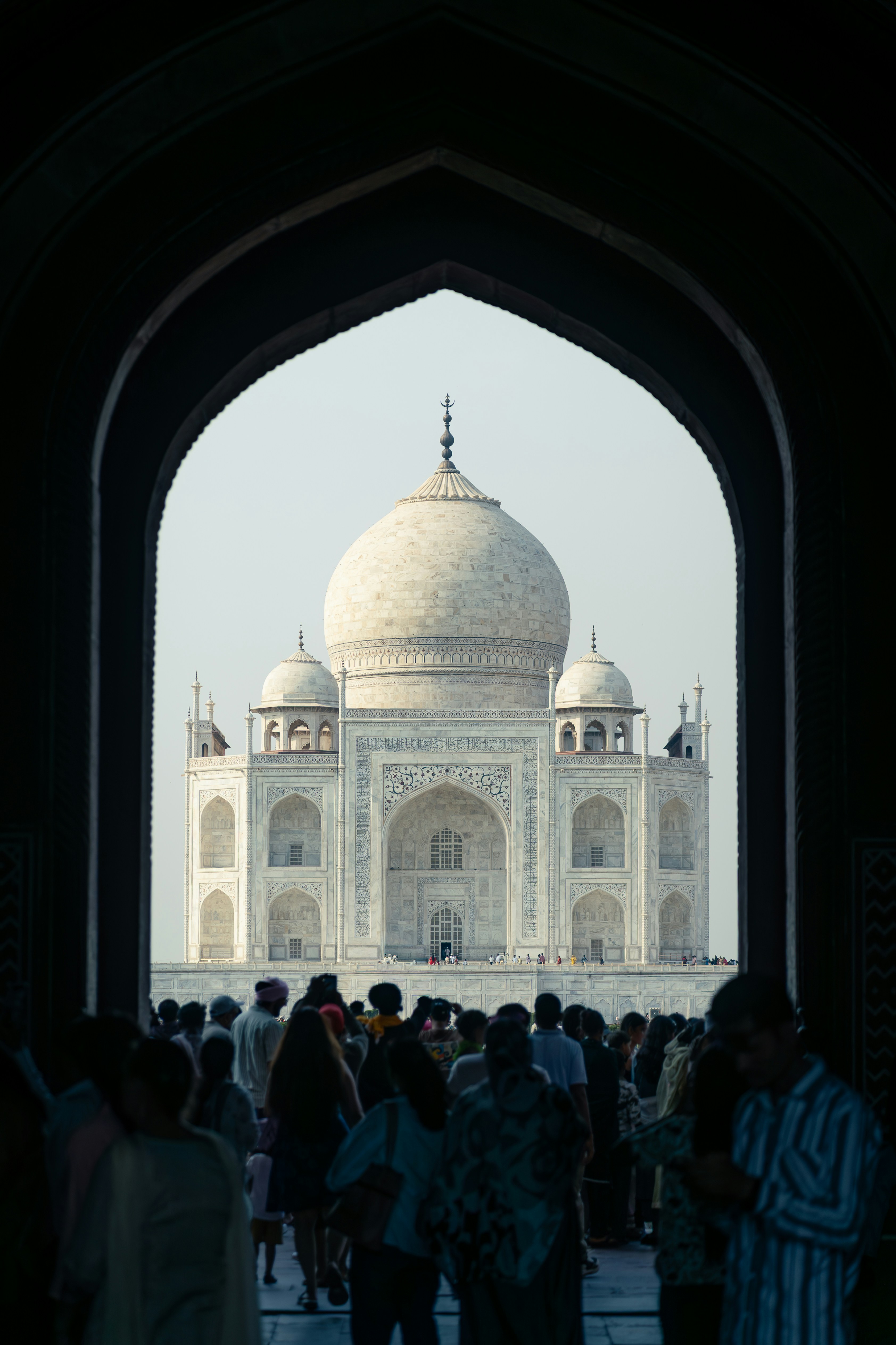 Emerald Silence: The Taj Mahal Through an Archway