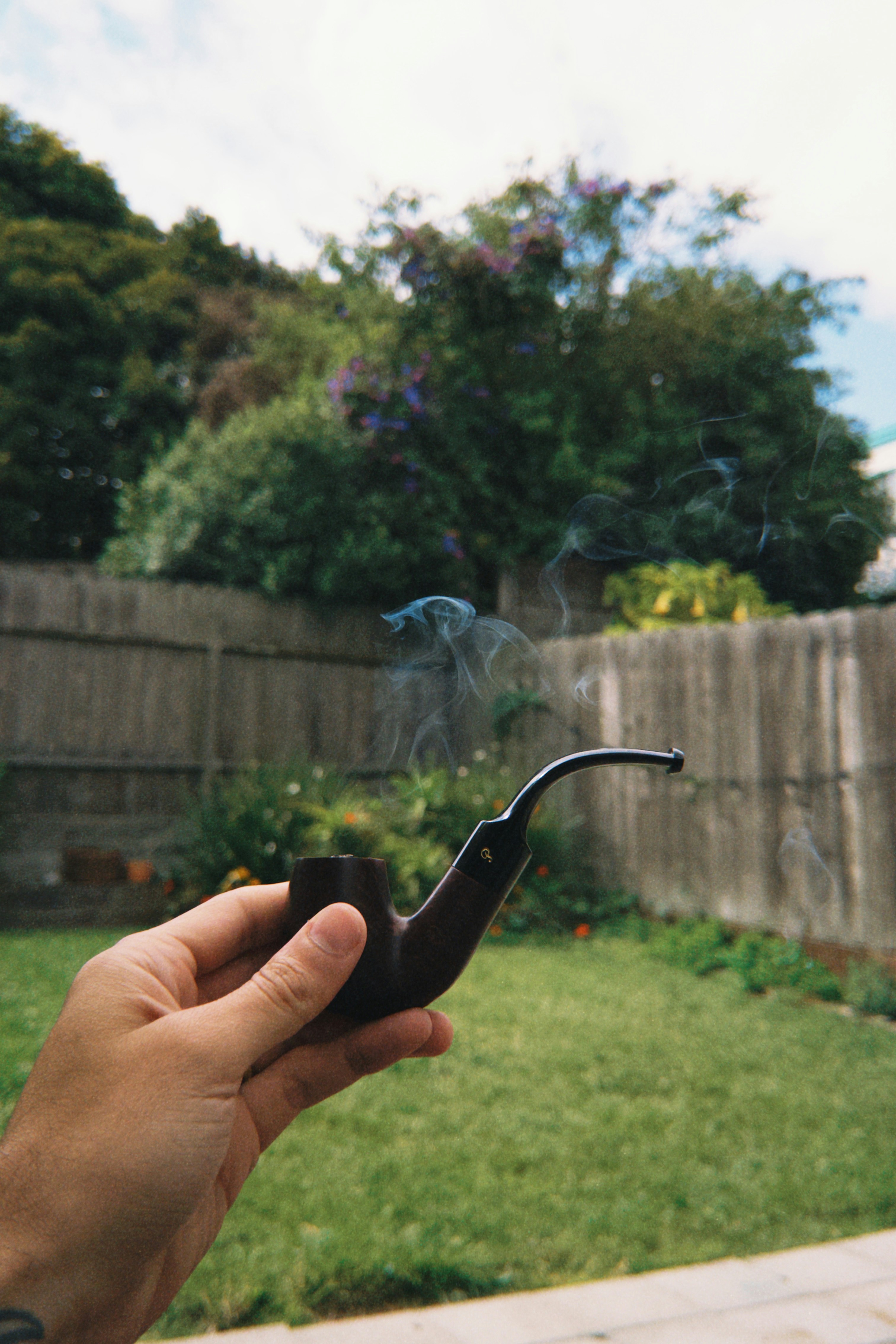 Smoke on the Pipe: A Handheld Moment in the Back Yard