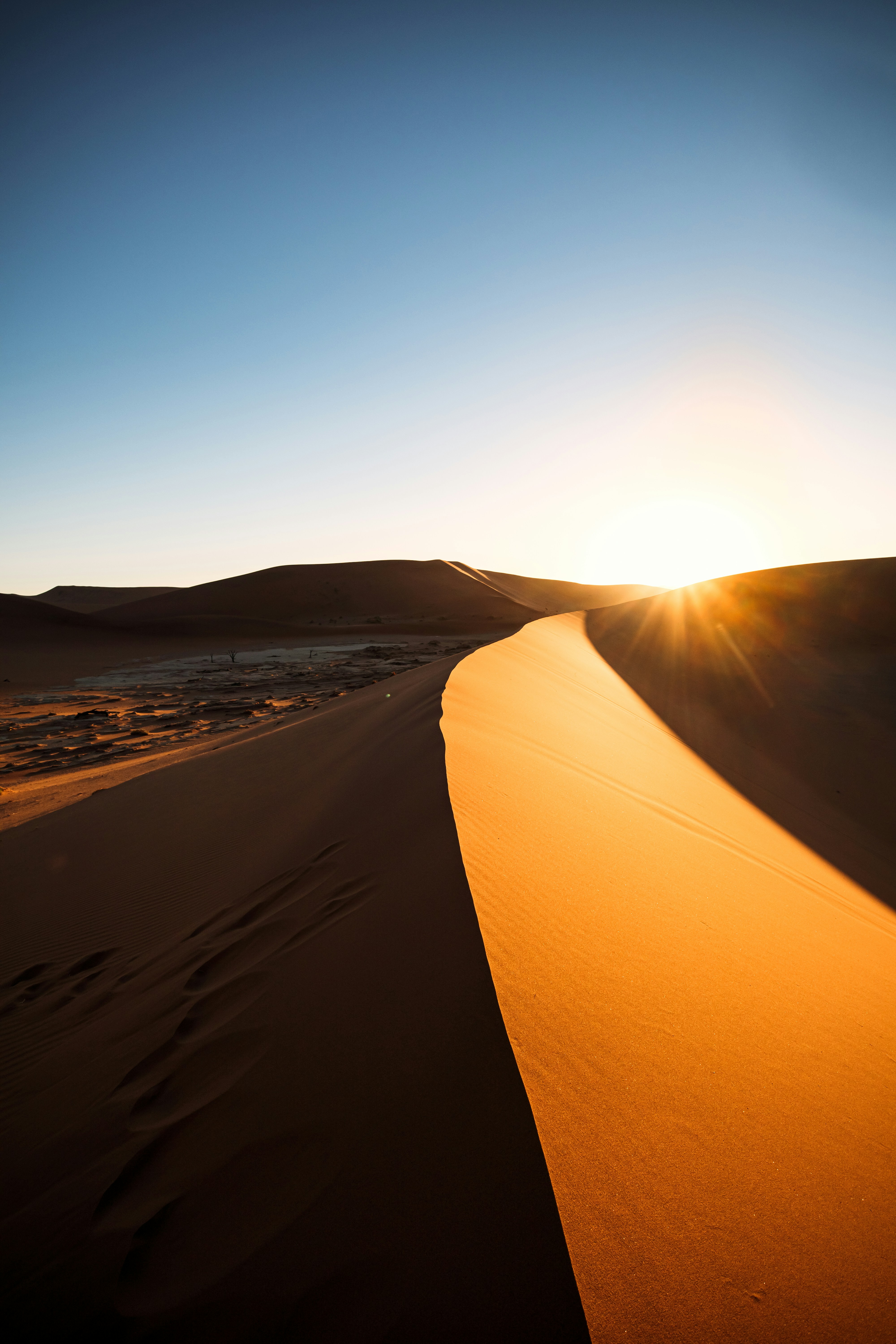 Sunlit Crest: A Dune Meeting the Horizon