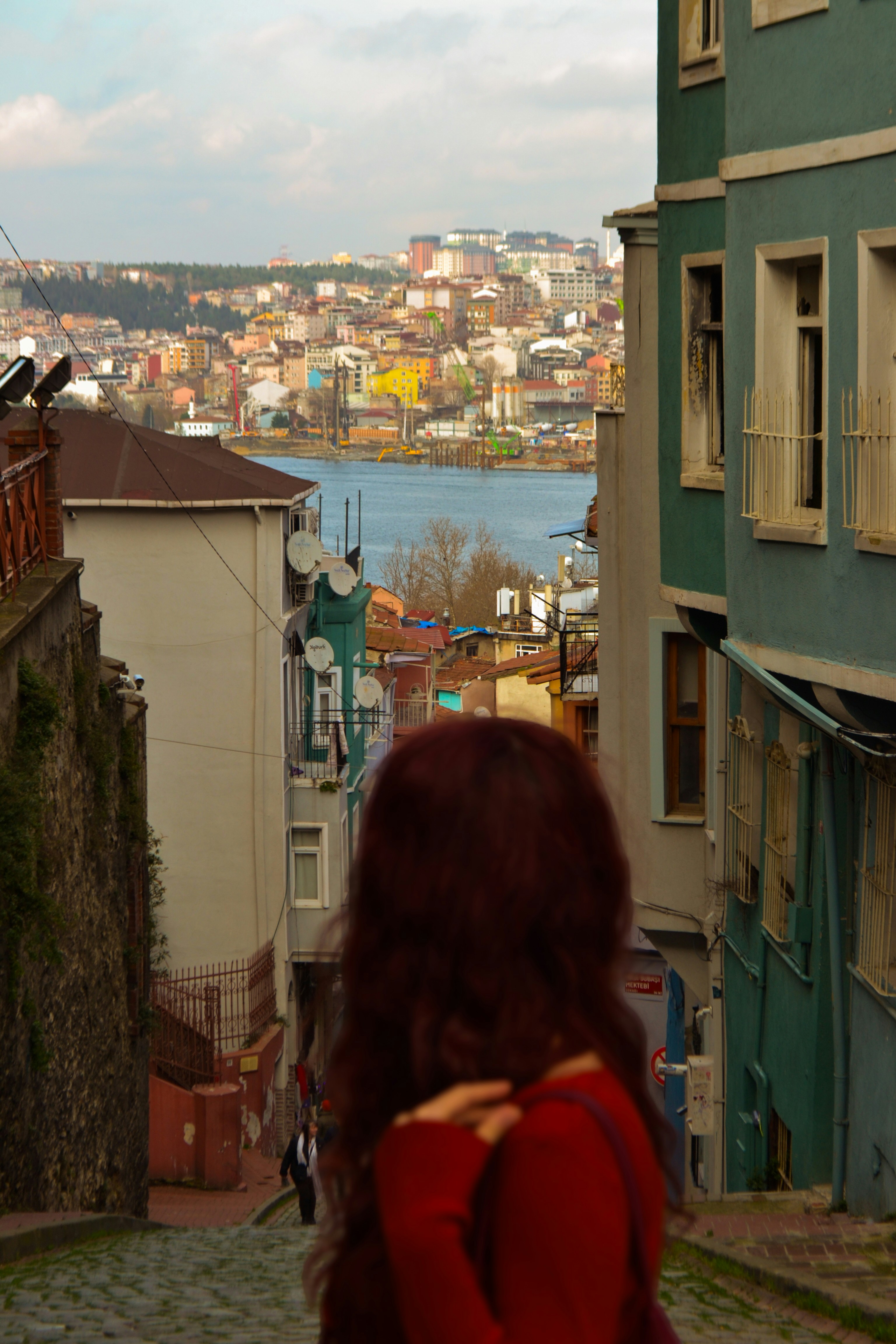 Eyes on the City: A Portrait Wrapped in Cobblestones and Sea Breeze