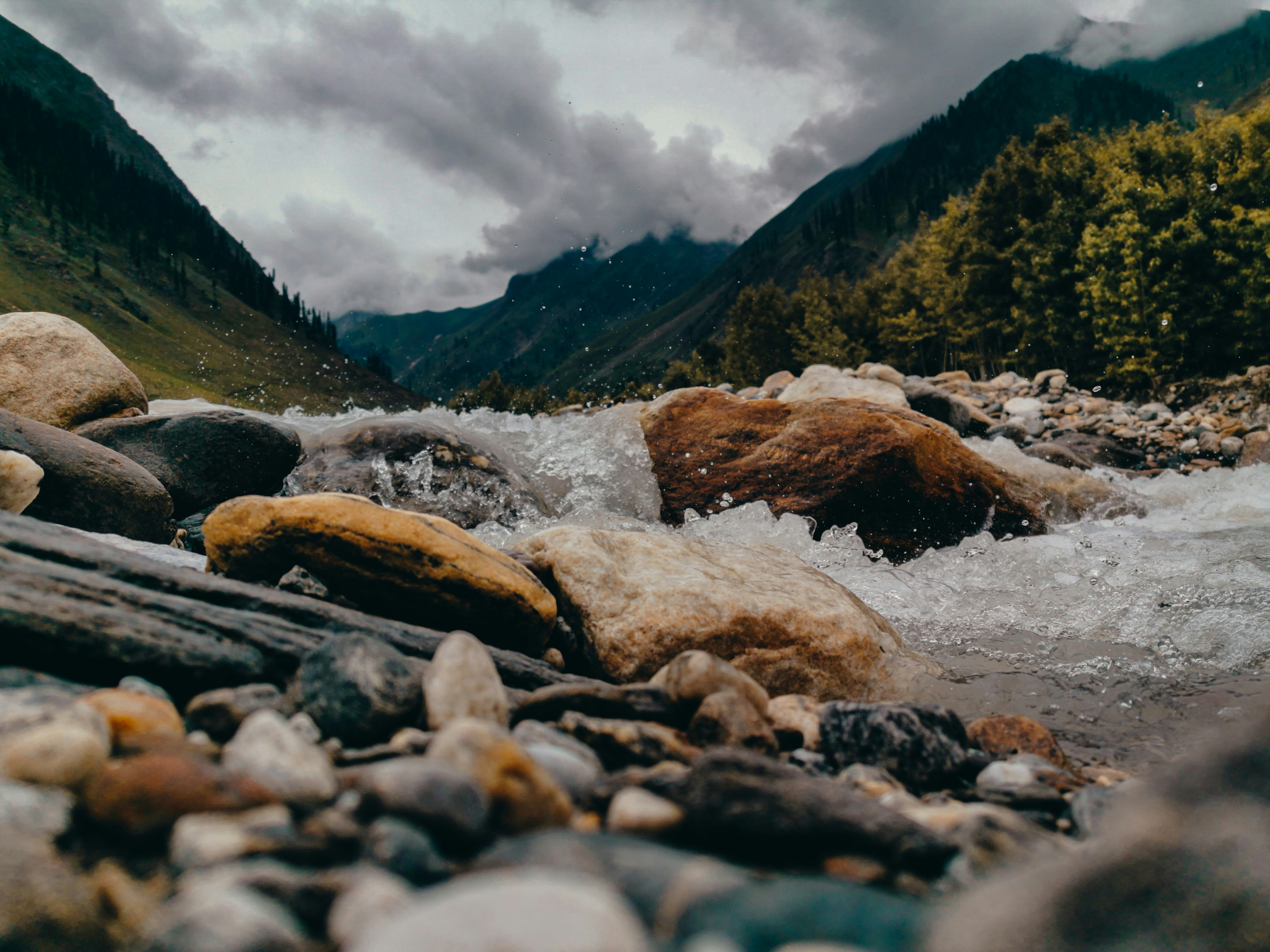 Rugged Riverbed in Mountain Veil