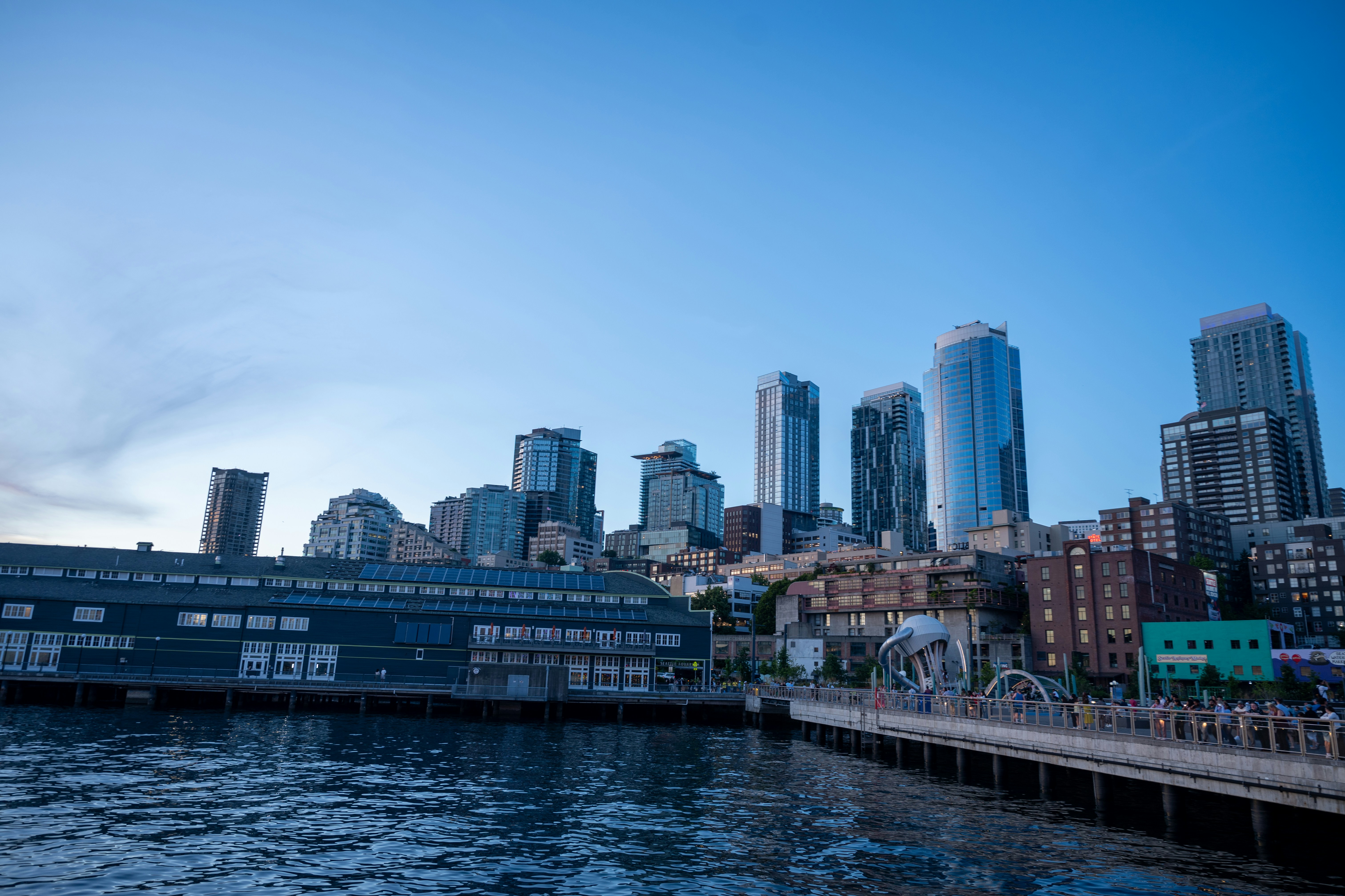 Harbor Skyline: Urban Waves Along a Quiet Waterfront