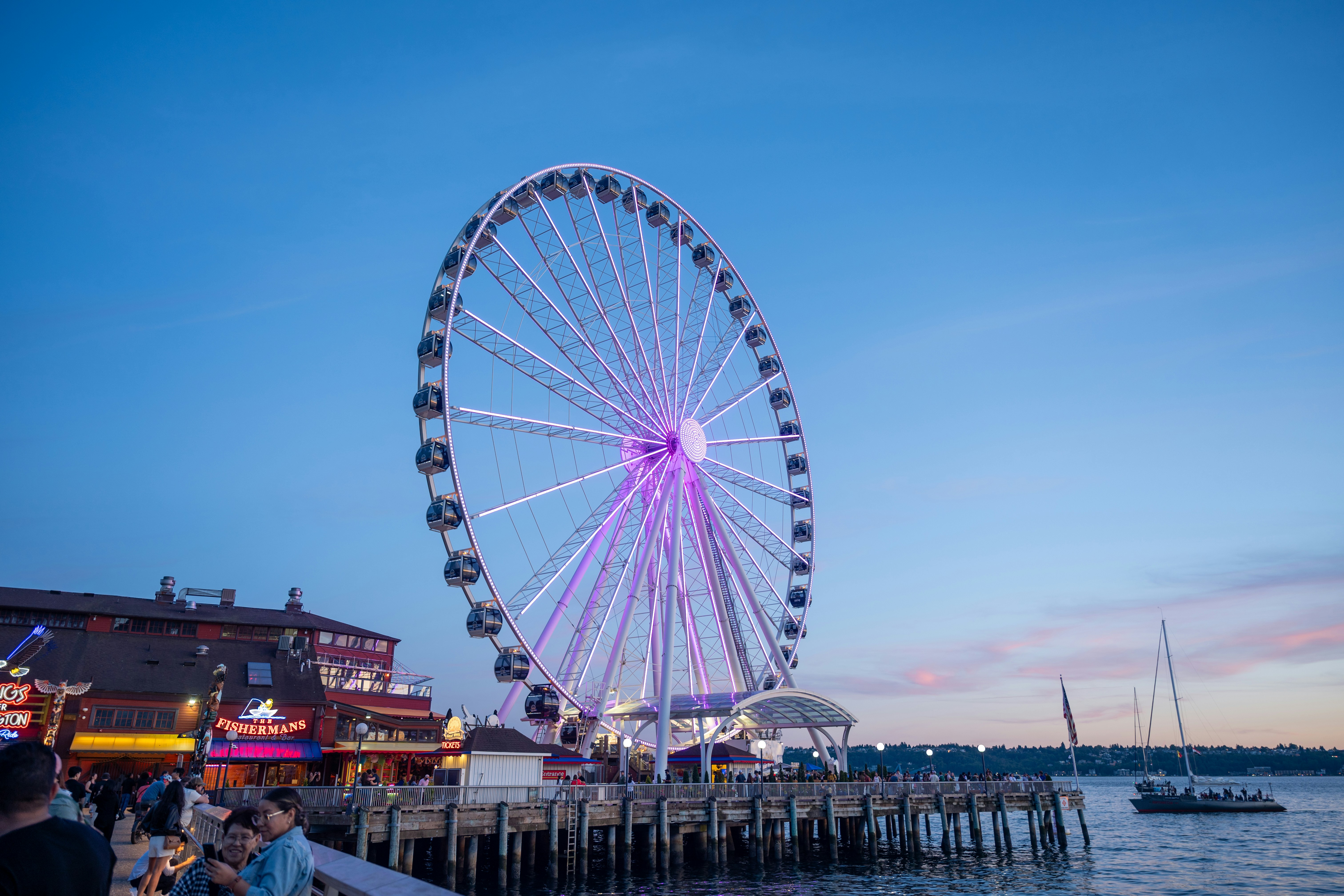 Luminescent Wheel over the Pier: Neon Run at Puget Sound