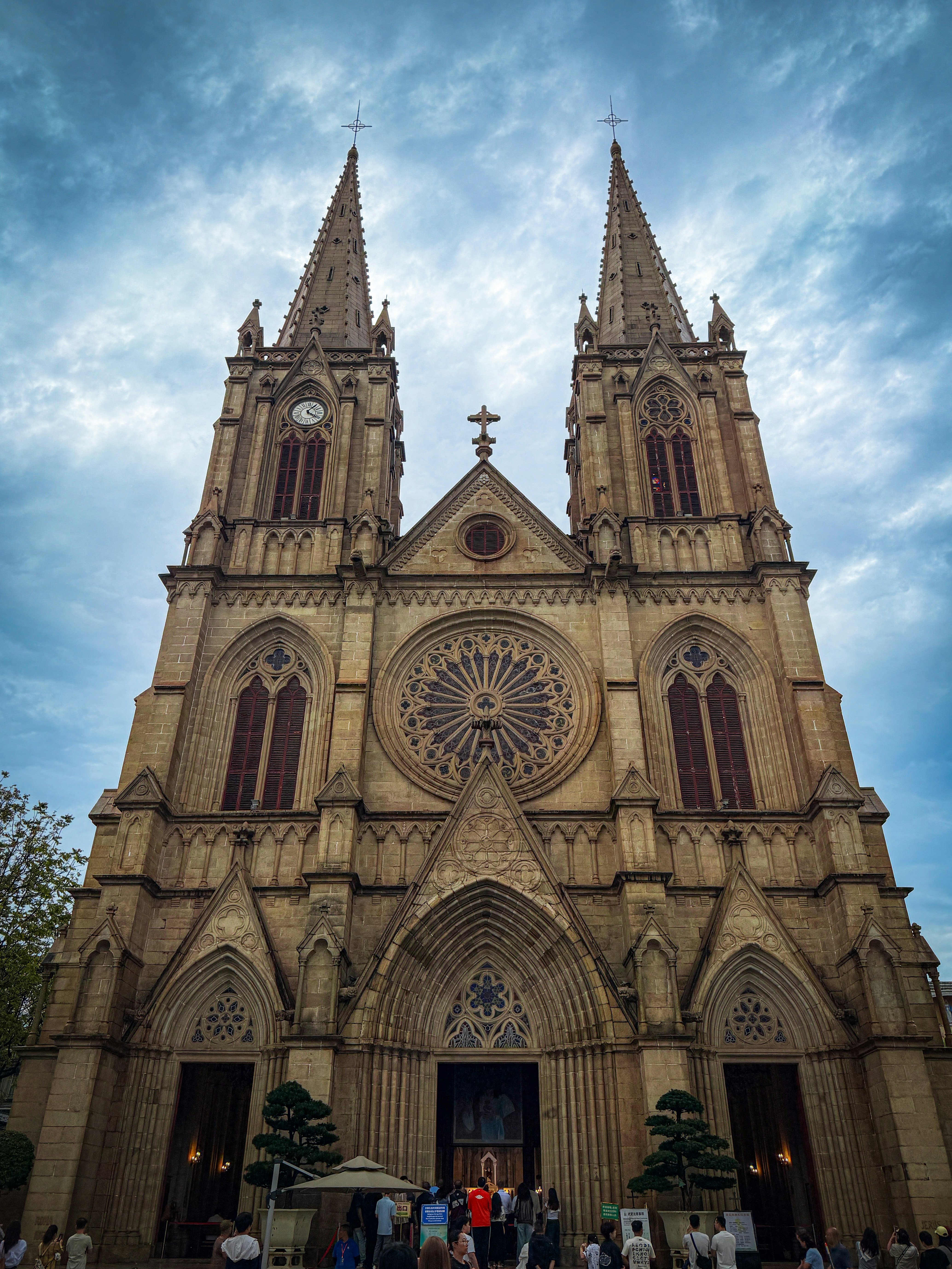 Gothic Facade Rising: A Twin-Spired Cathedral at Dusk