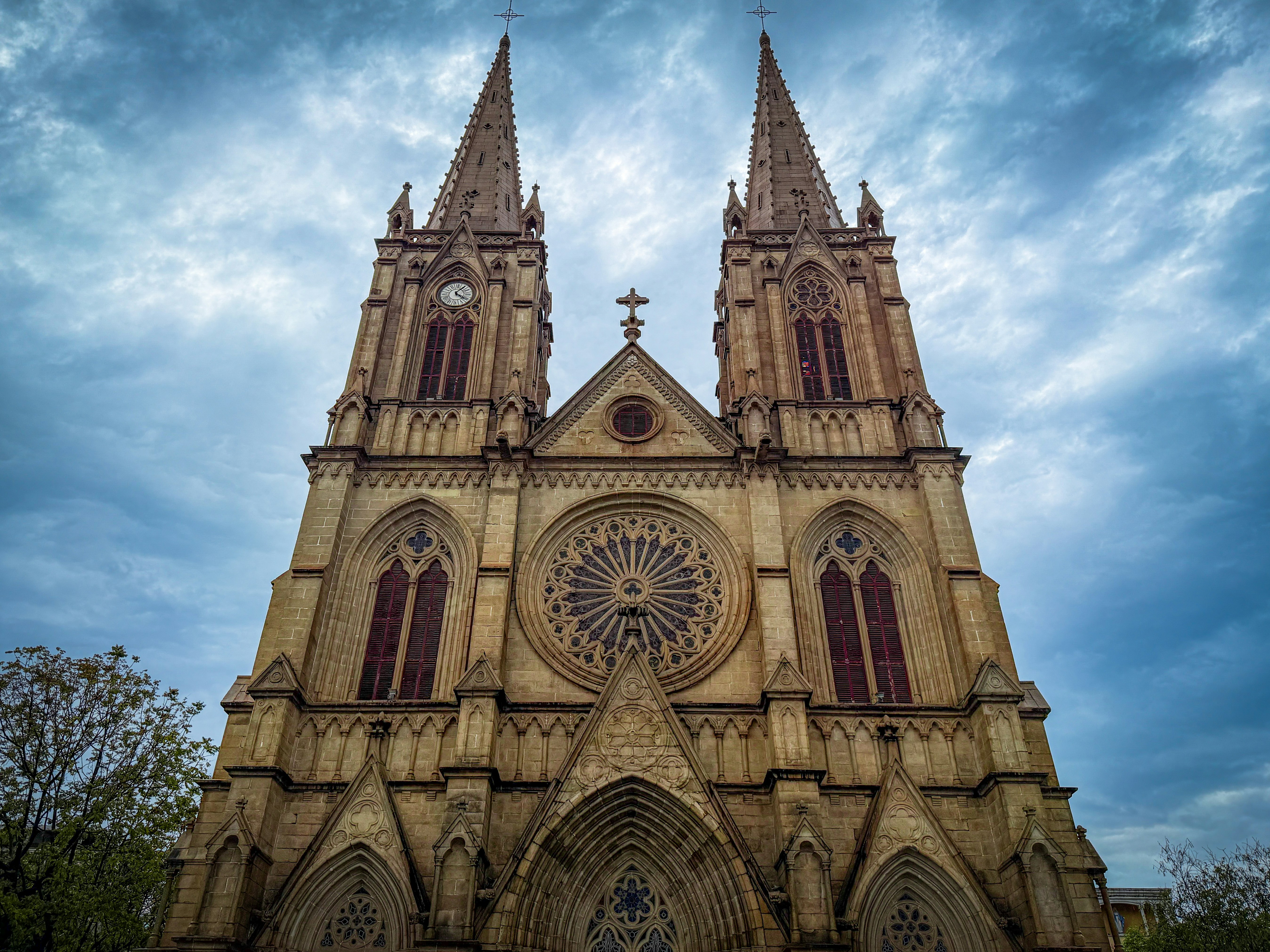 Gothic Cathedral Rising: Twin Spires Framing a Rose Window