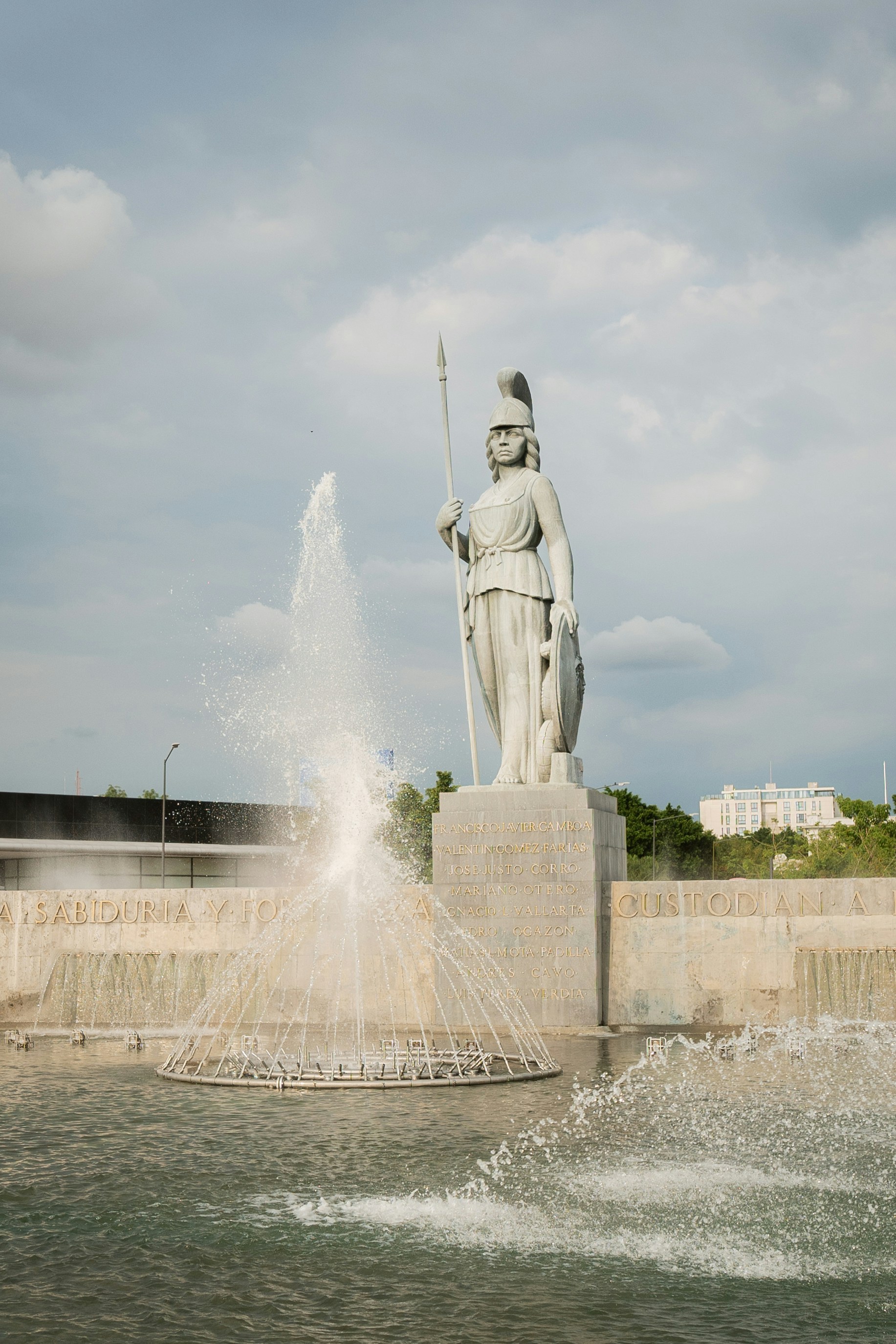 Guardians of the Fountain: A Monumental Silhouette Against Sky
